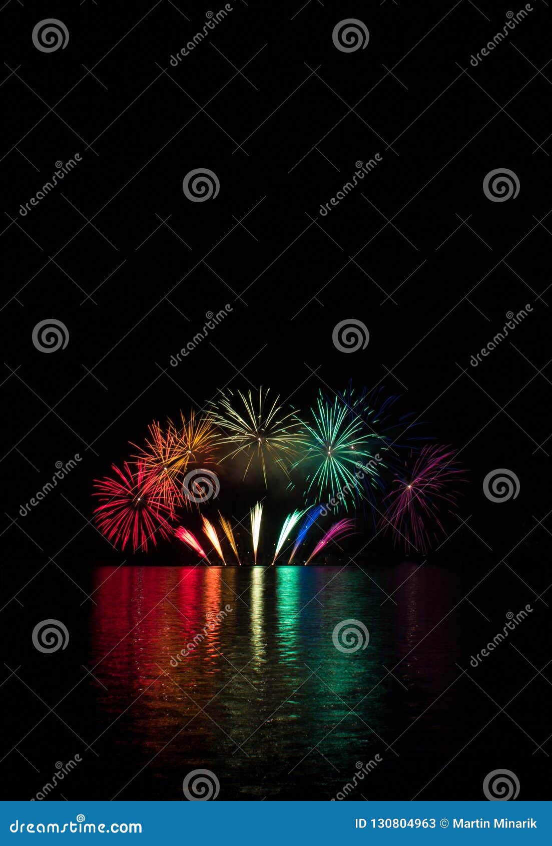 Burst of Exploding Fountains in the Color of Rainbow Over Surface of ...