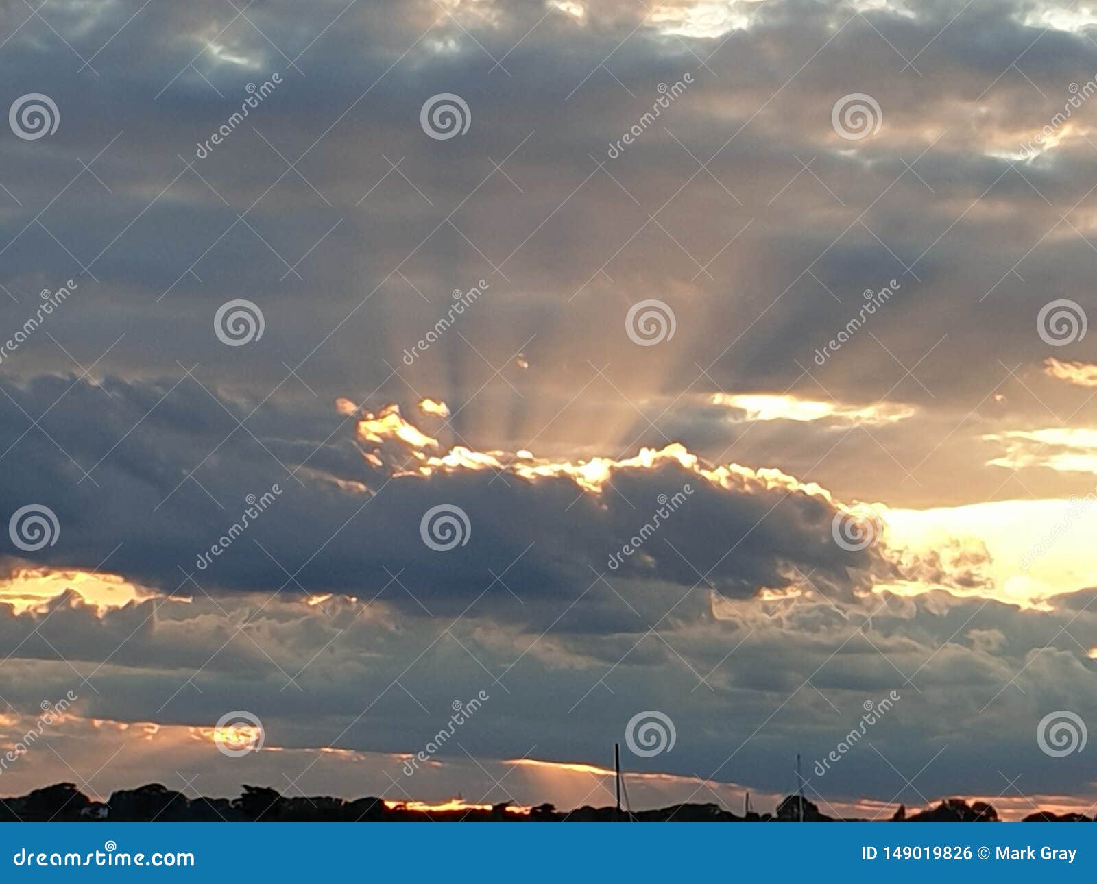 A Burst of Sunlight stock photo. Image of clouds, sunrays - 149019826