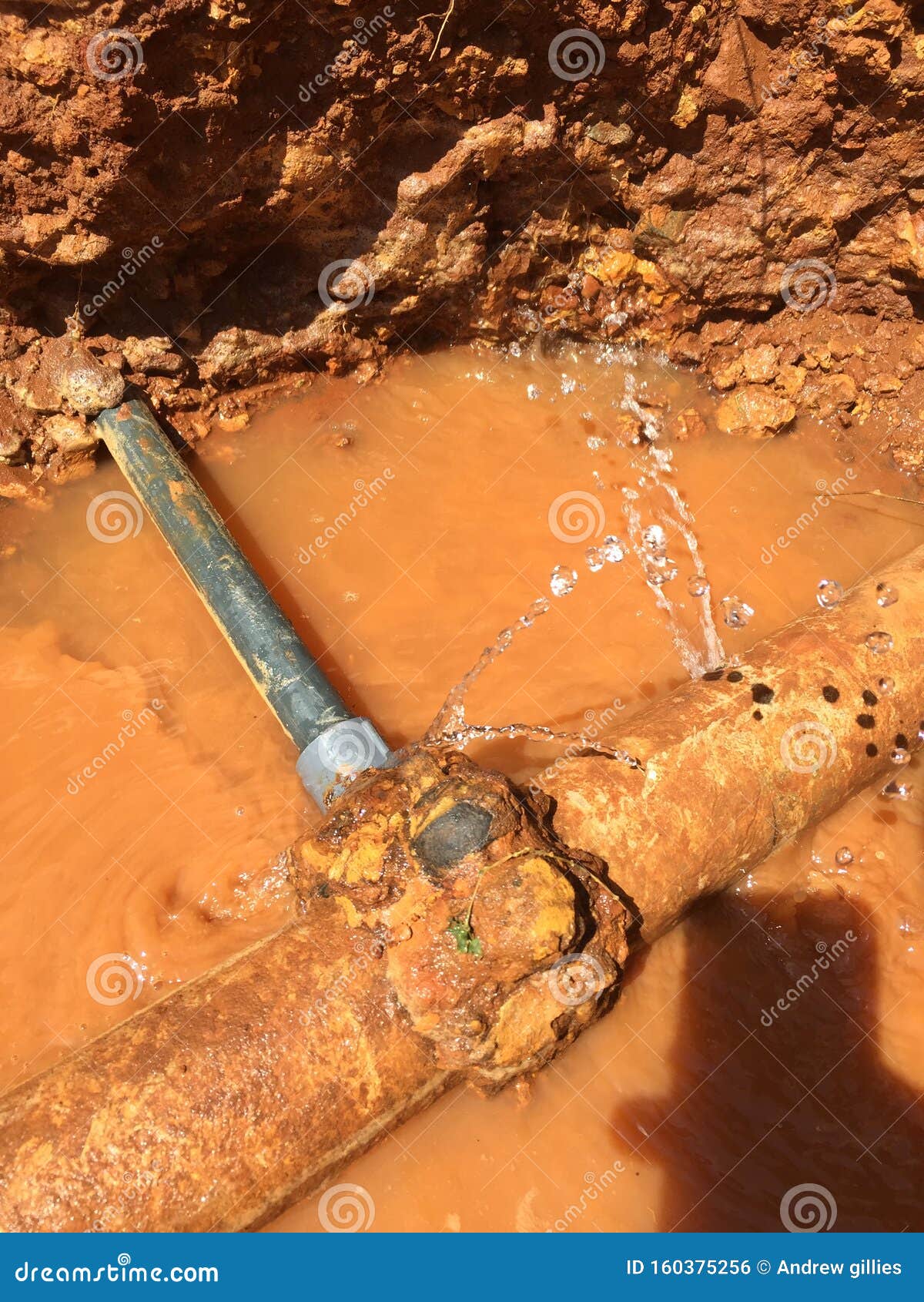 Burst water main stock photo. Image of spraying, pipe - 160375256
