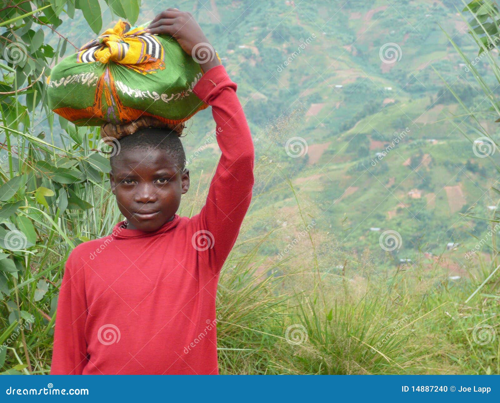 Burundi Boy with Sack on Head Editorial Image - Image of grass, package ...