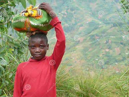 Burundi Boy with Sack on Head Editorial Image - Image of grass, package ...