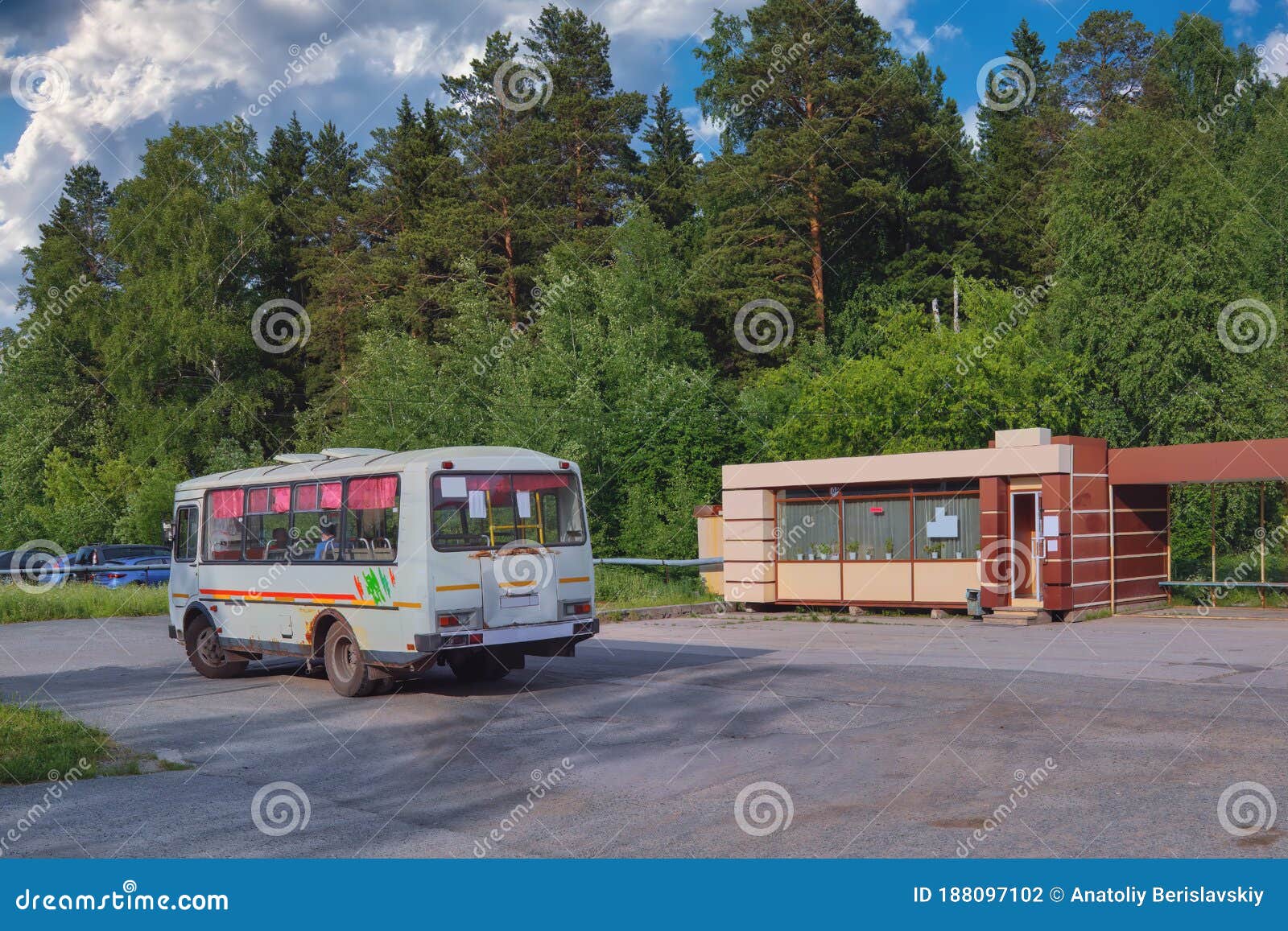 A Bus Awaits Passengers at a Stop in a Small Town Editorial Photography ...