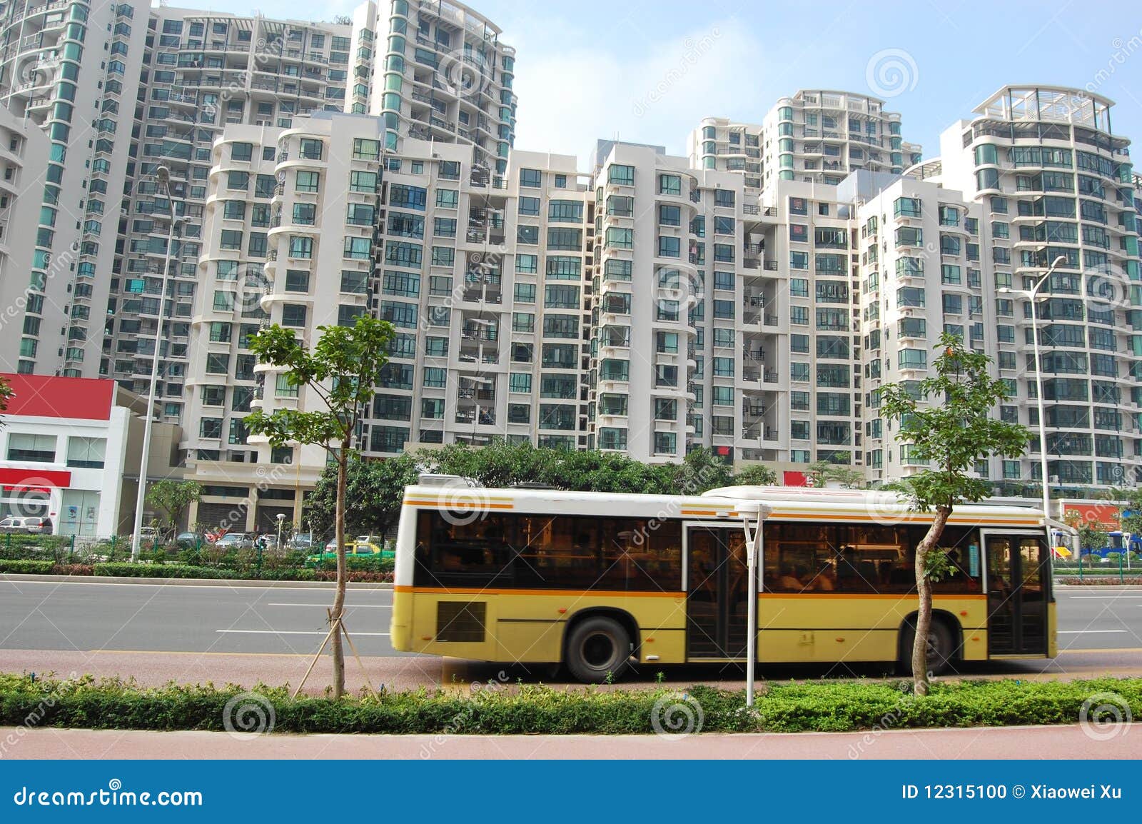 The bus in city stock photo. Image of apartment, skyscraper - 12315100