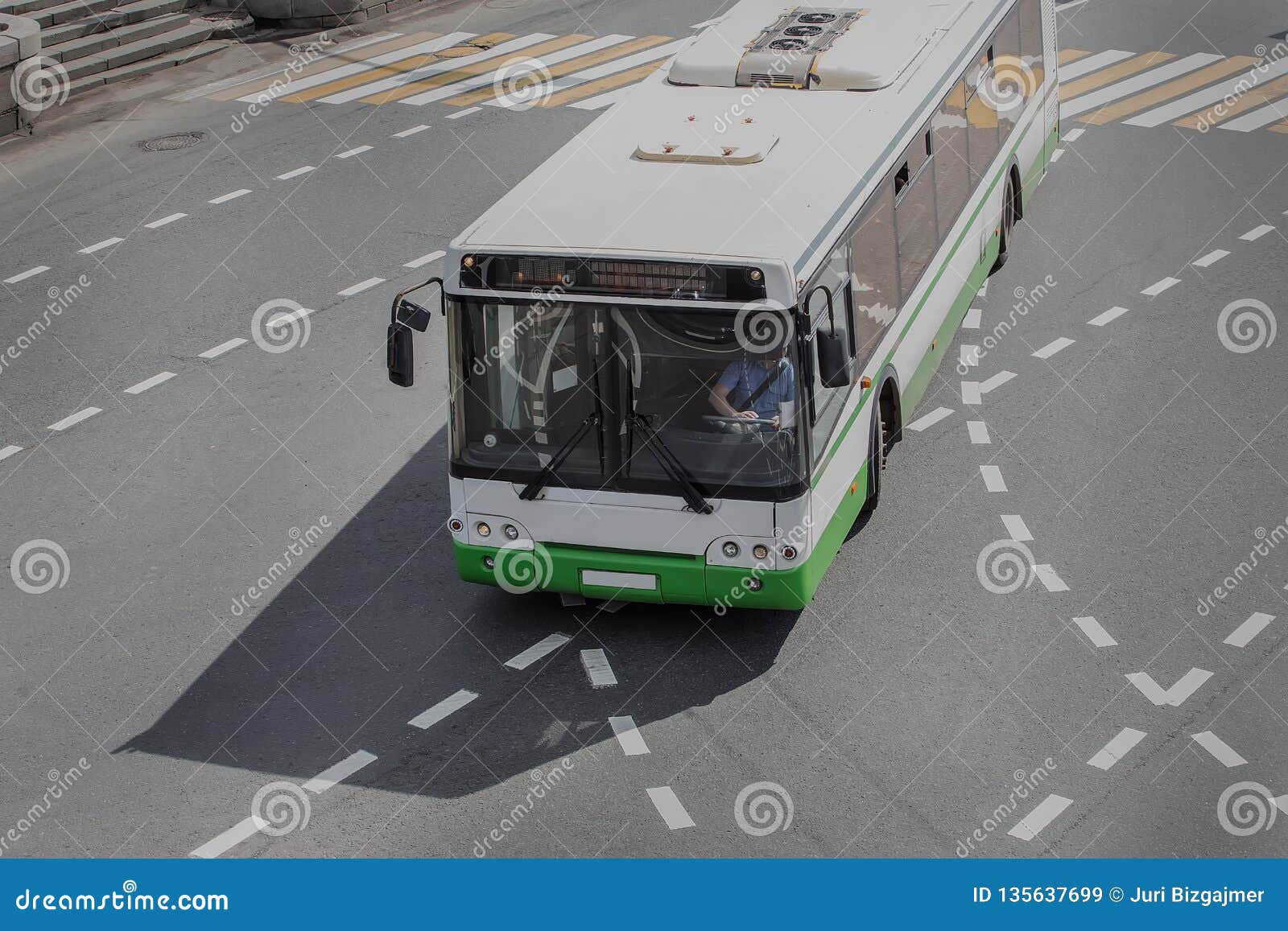 Bus at city intersection stock image. Image of street - 135637699