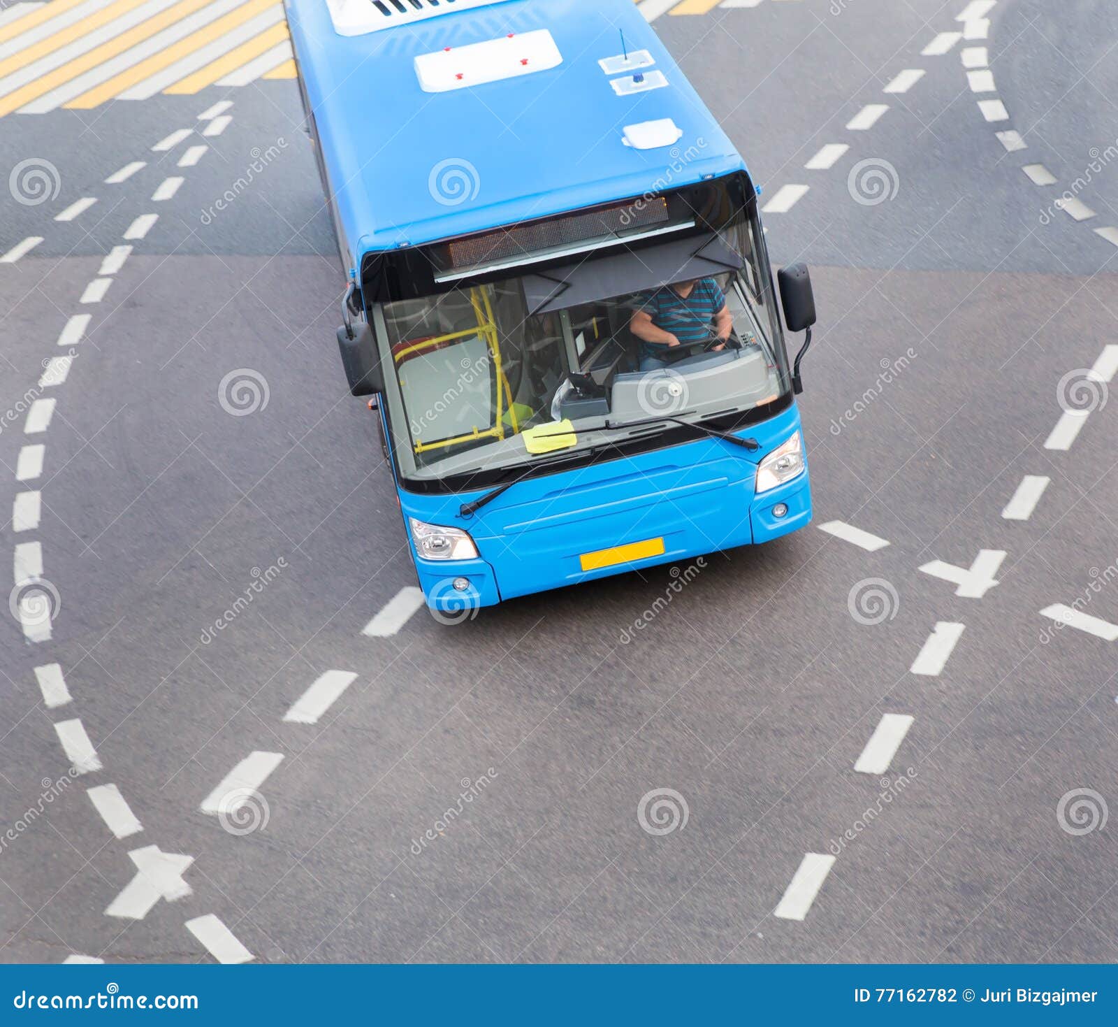 Bus at city intersection stock photo. Image of movement - 77162782