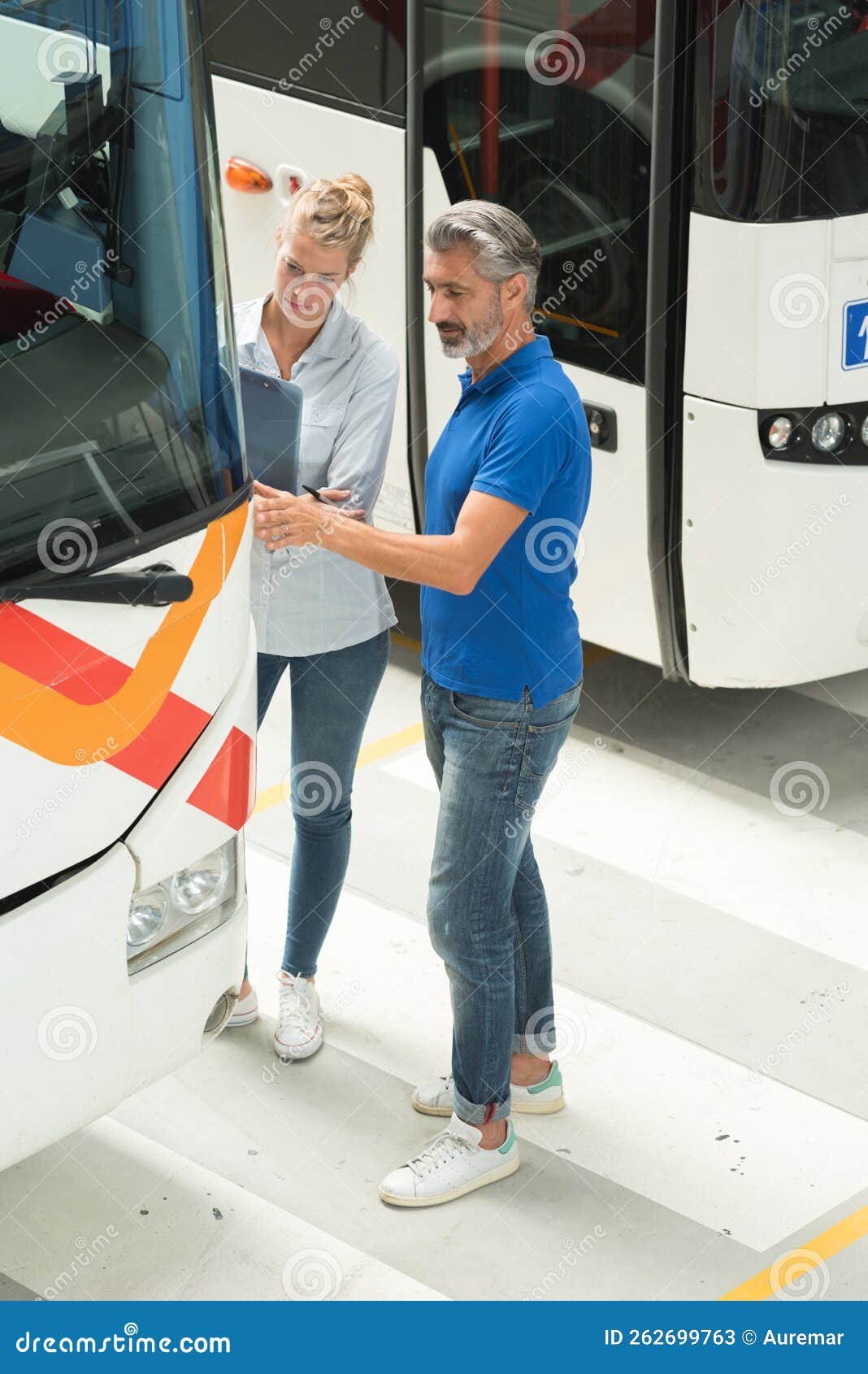 Bus Company Workers Looking at Bus Stock Image - Image of shop ...