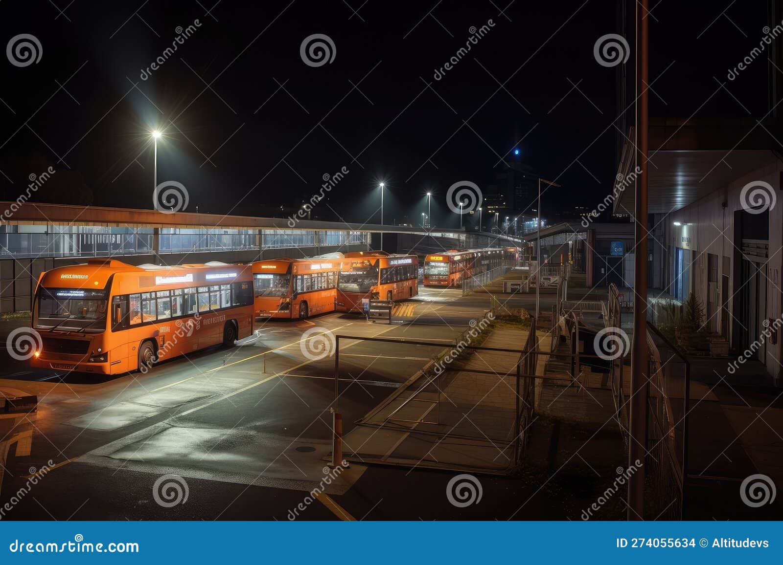 Bus Depot at Night, with the Illuminated Sign and Buses in the ...