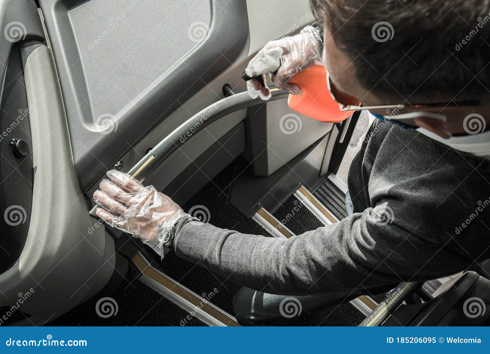 Bus Driver Sanitizing Railings Using Alcohol in Spray Stock Image ...