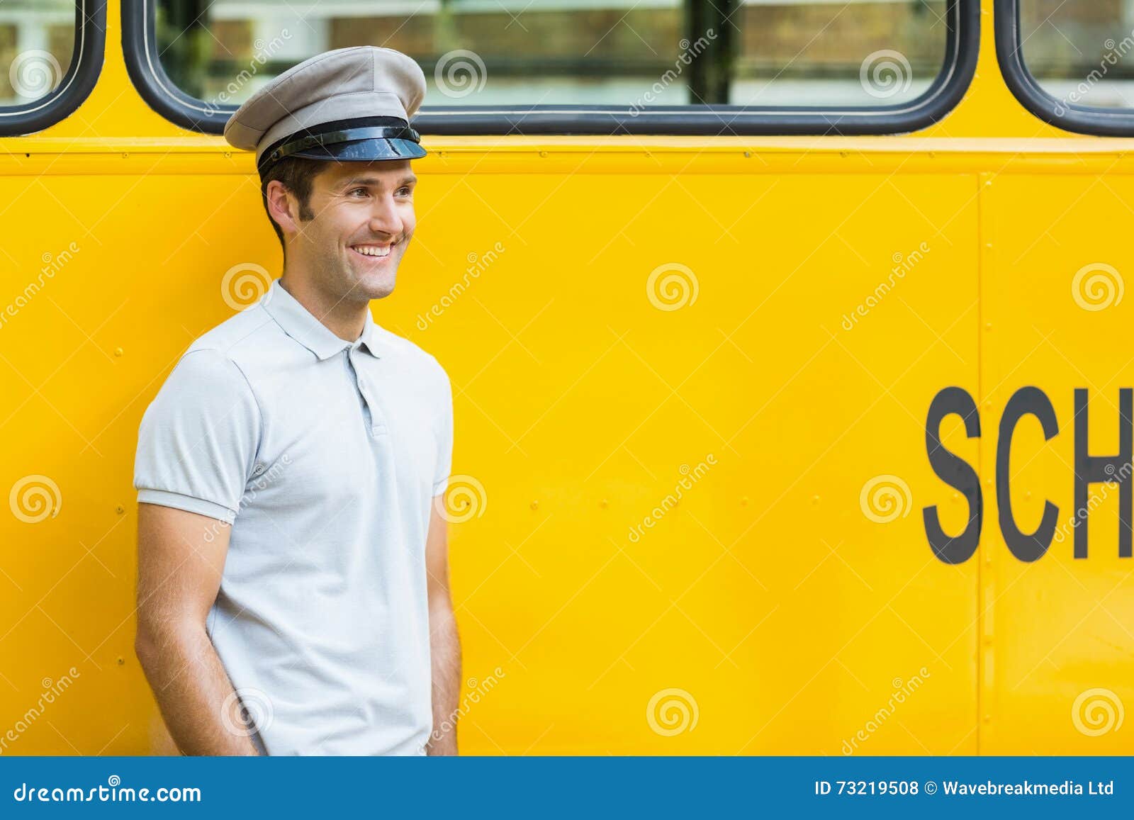 Bus Driver Smiling in Front of Bus Stock Photo - Image of outdoors ...