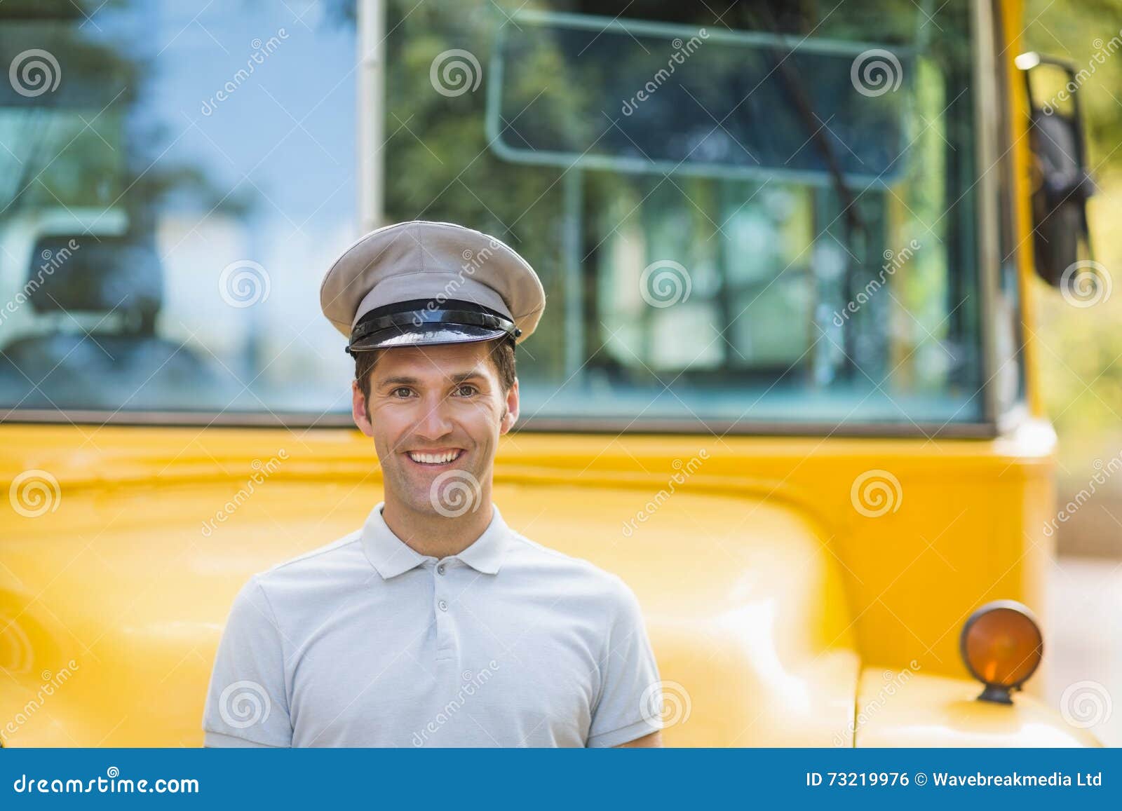 Bus Driver Smiling in Front of Bus Stock Photo - Image of people ...