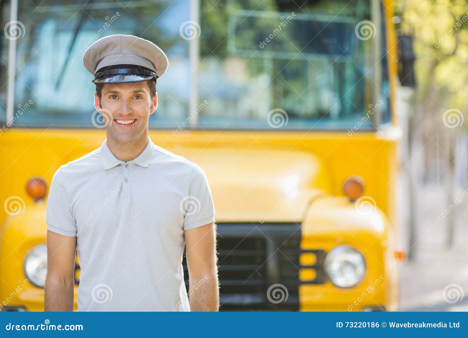 Bus Driver Smiling in Front of Bus Stock Photo - Image of looking ...