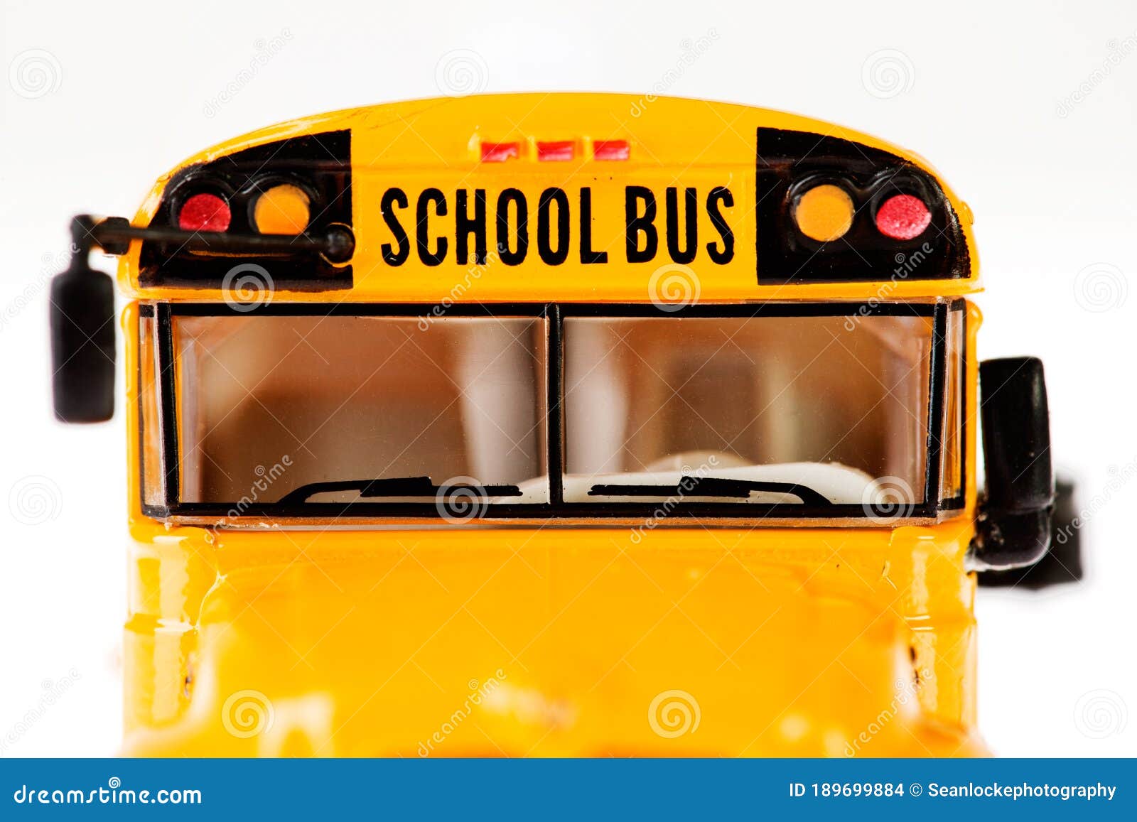Bus: Front View of School Bus Words on Toy Stock Photo - Image of ...