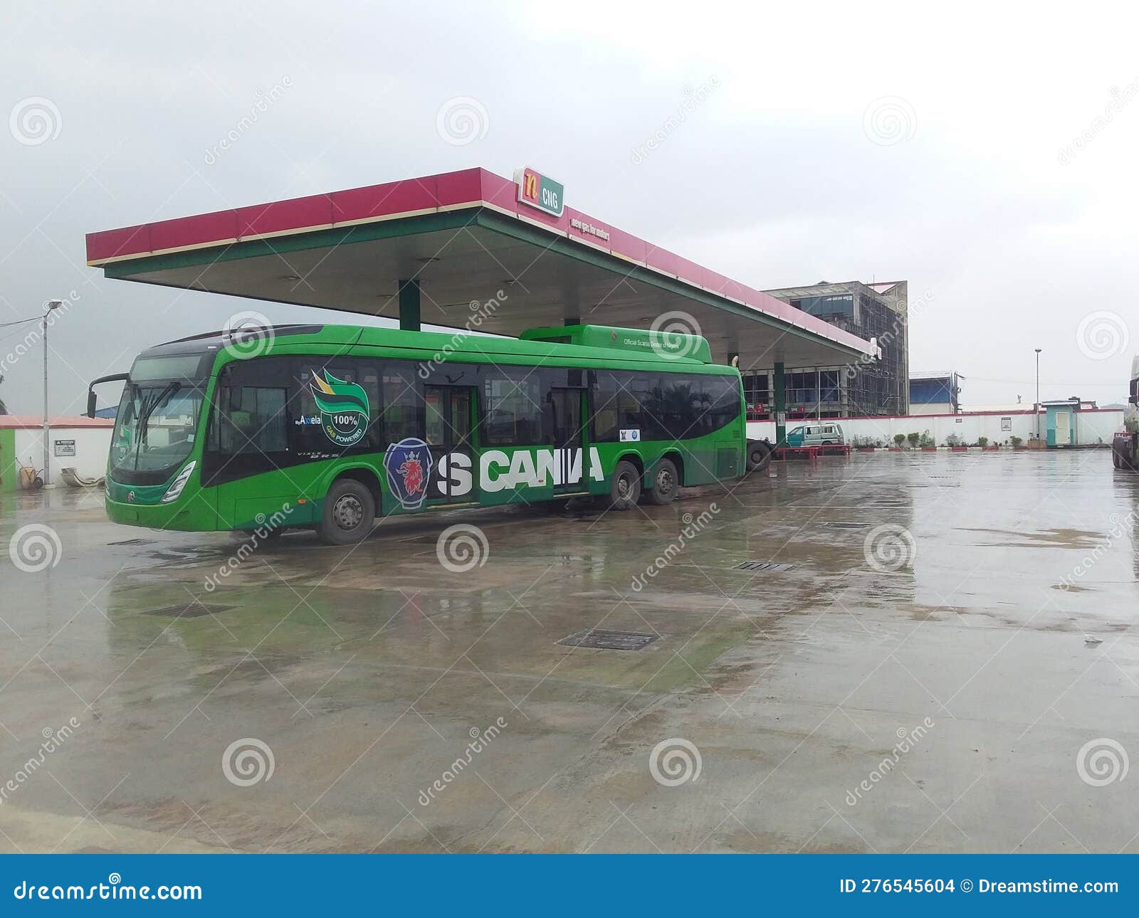 Bus in a Gas Station on a Rainy Day Editorial Stock Image - Image of ...