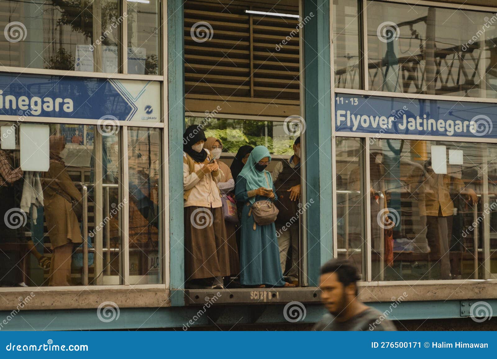Bus Passengers Waiting at the Bus Stop. Editorial Photo - Image of stop ...