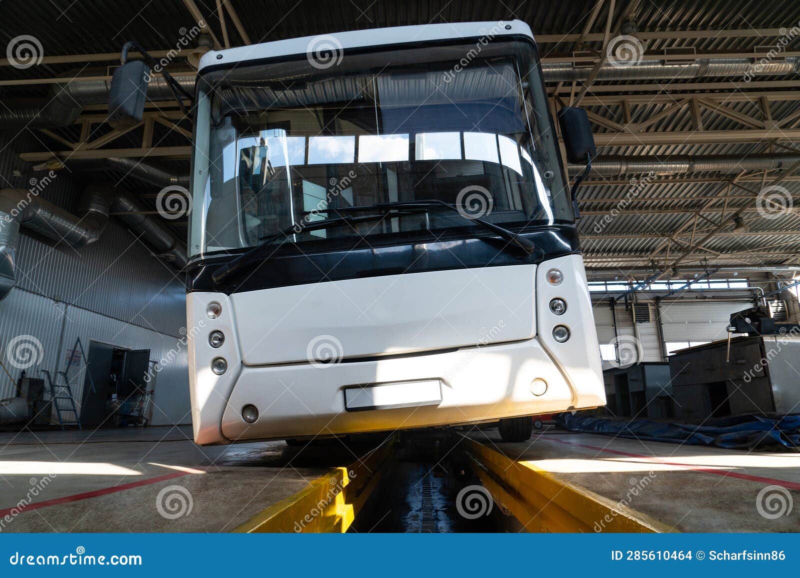 Bus repair in car service stock photo. Image of service - 285610464