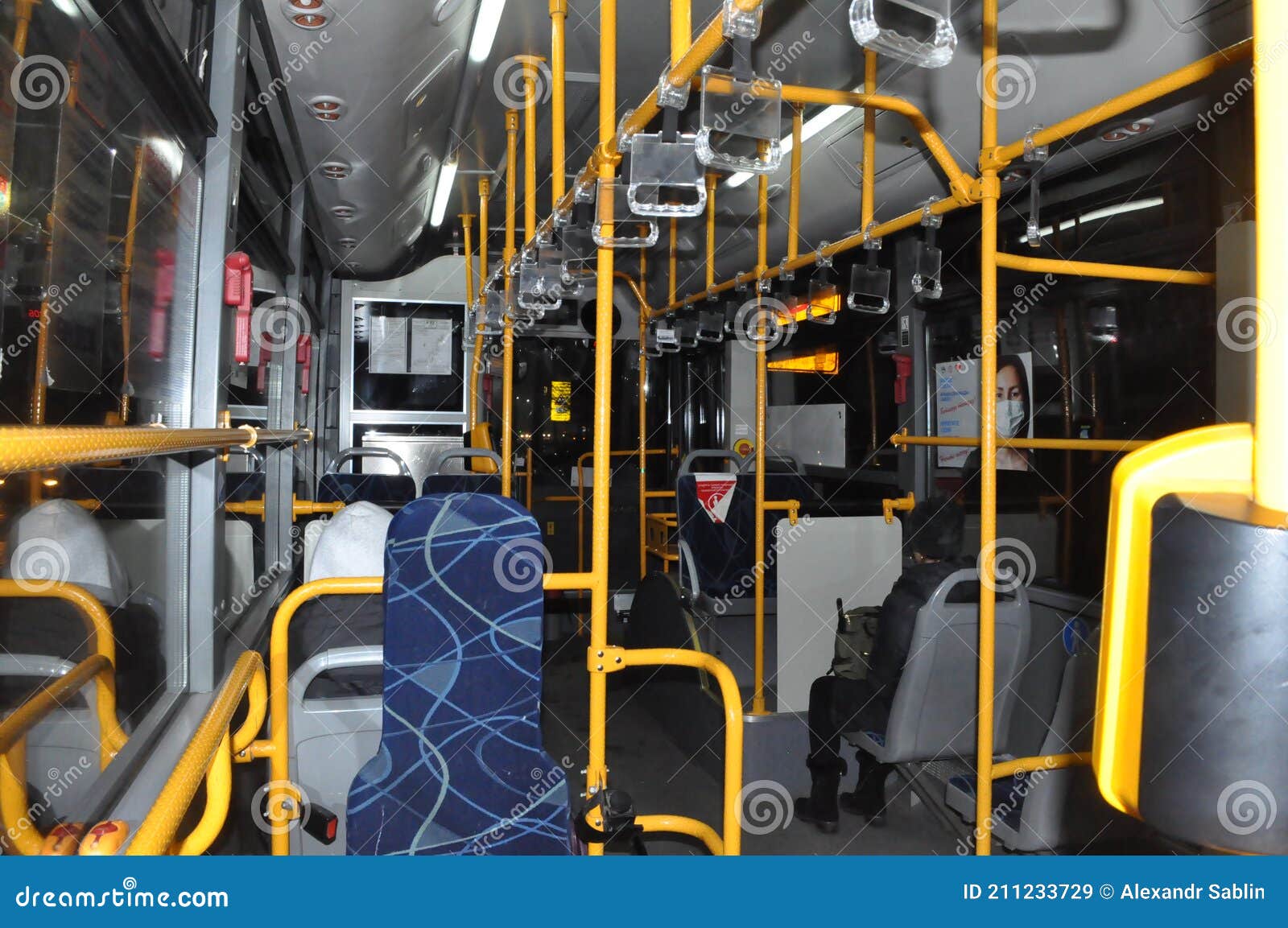 Empty bus cabin at night stock image. Image of coach - 211233729