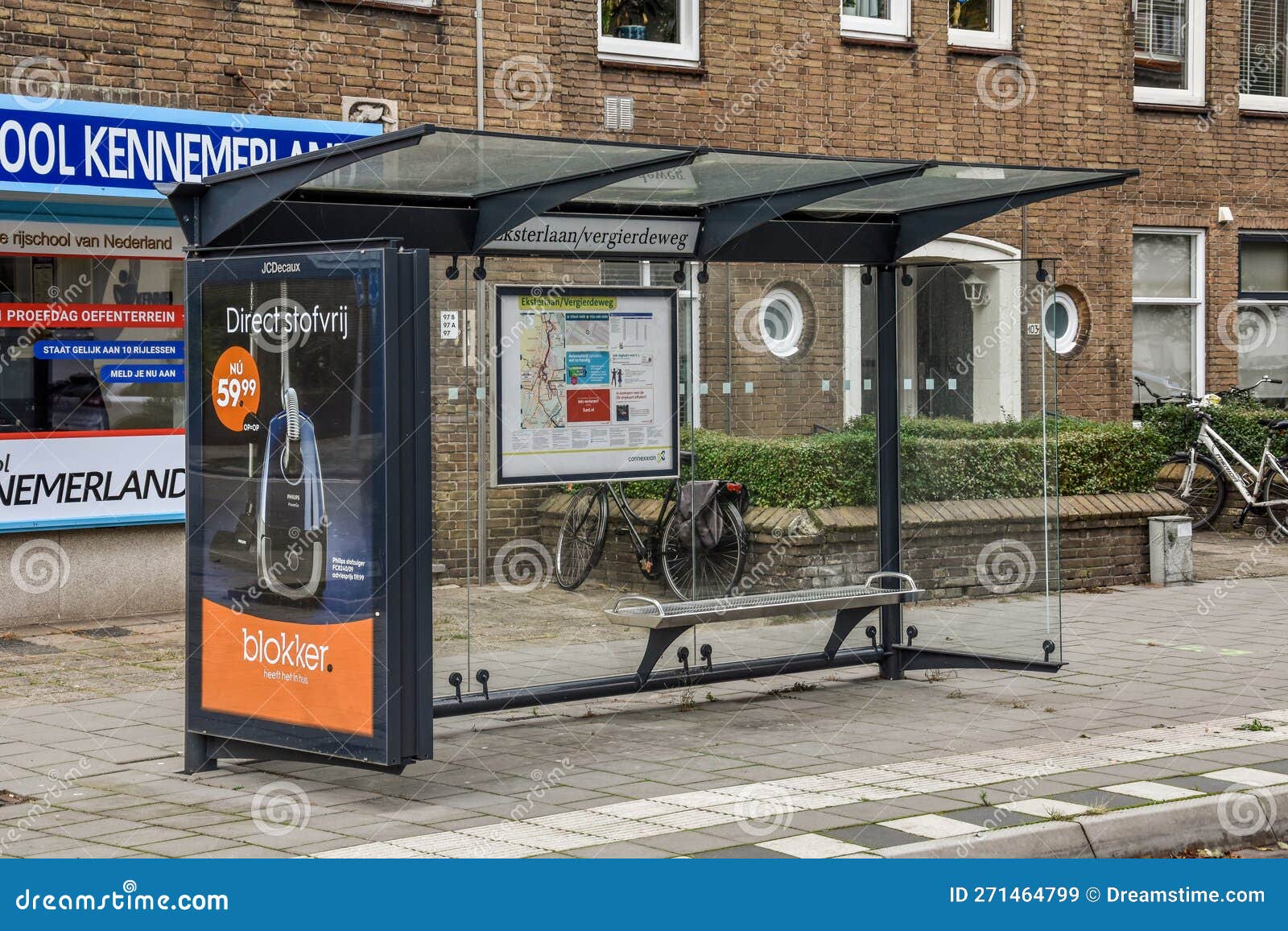 A Bus Stop with a Bench Next To a Bus Editorial Stock Image - Image of ...