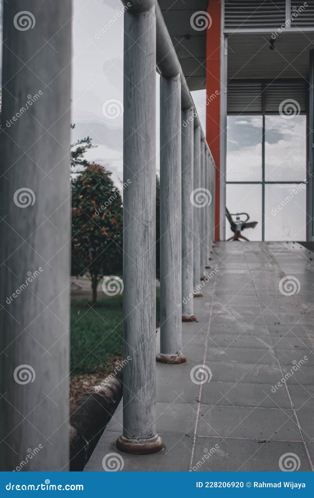 The Bus Stop in Front of the Campus Area Stock Photo - Image of column ...