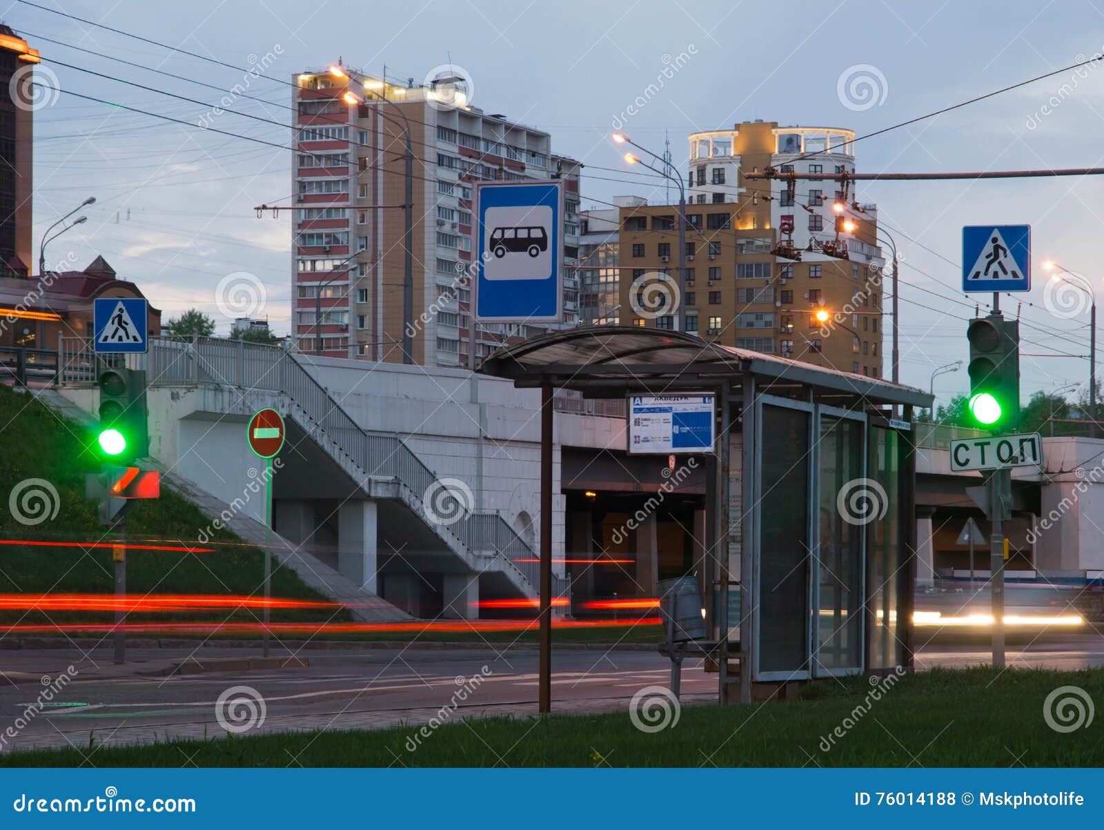 Bus Stop and Green Traffic Light Stock Photo - Image of asphalt ...