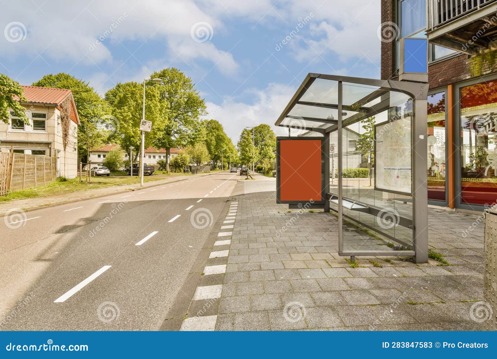 A Bus Stop on the Side of a Road Stock Image - Image of sidewalk ...