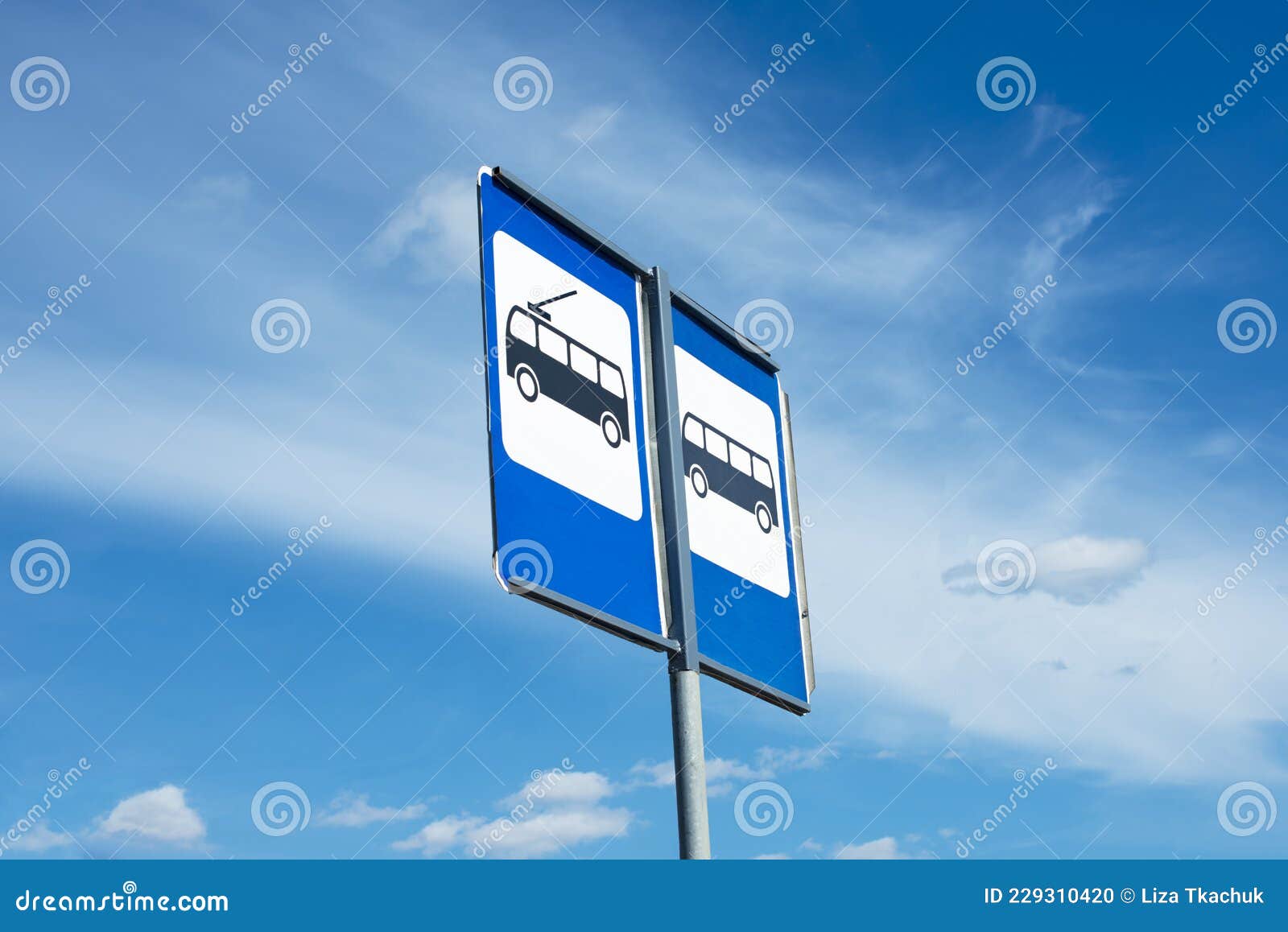 The Bus Stop Sign on Blue Background on the Beautiful Sky Stock Photo ...