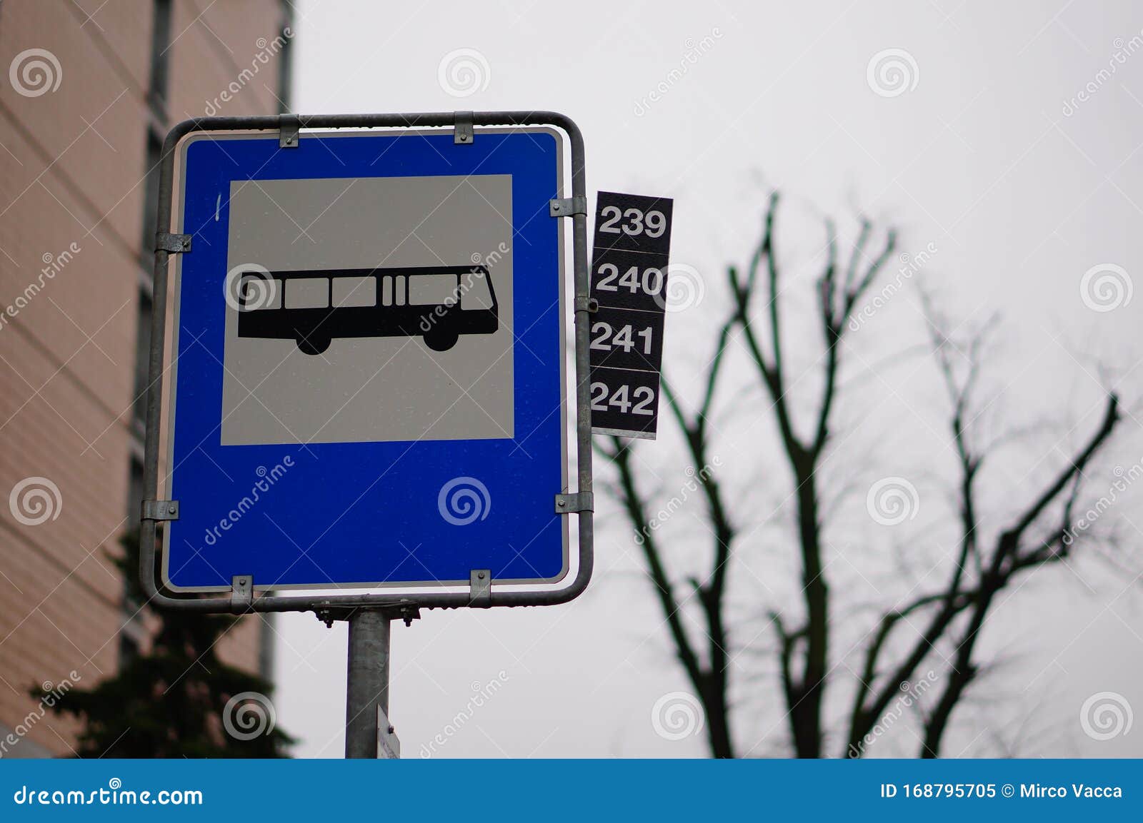Bus Stop Sign on a Post in the City. Stock Image - Image of stop, post ...