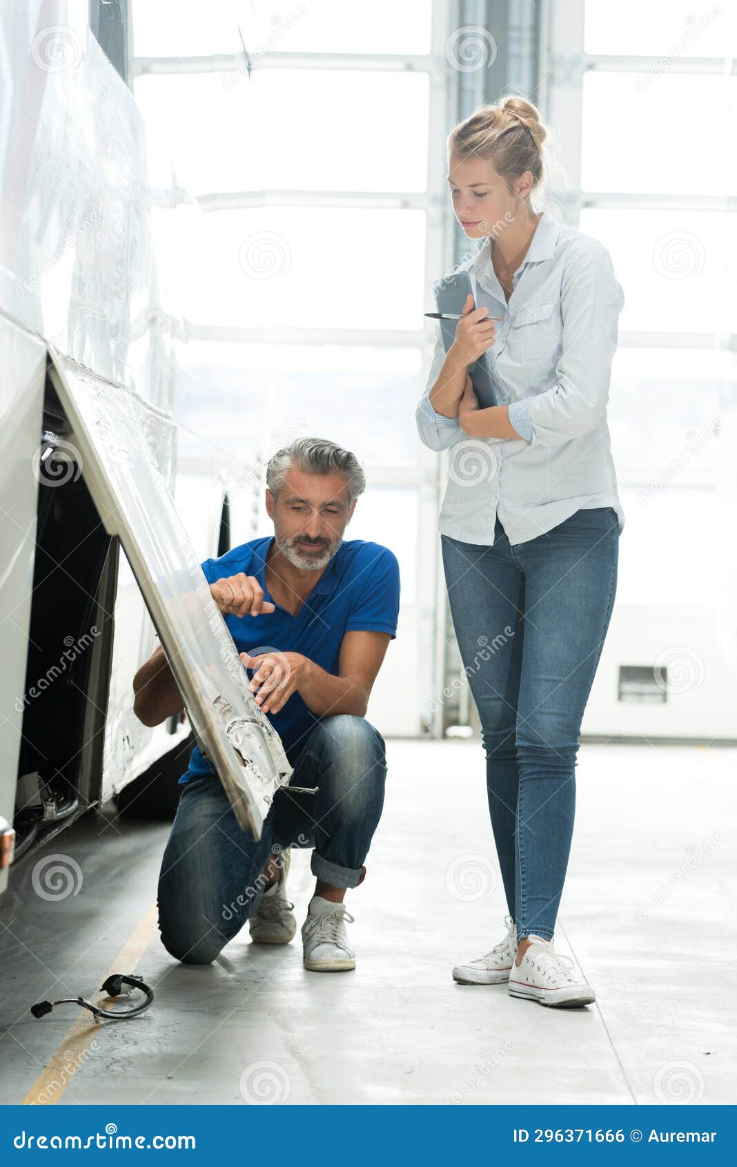 Bus and Truck Waiting for Service in Garage Stock Photo - Image of ...