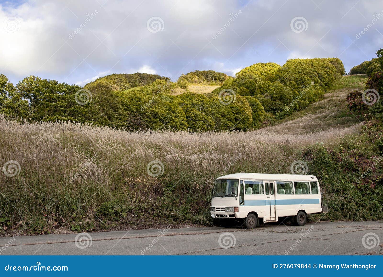 The Bus Was Parked on the Side of the Hill. Stock Photo - Image of ...