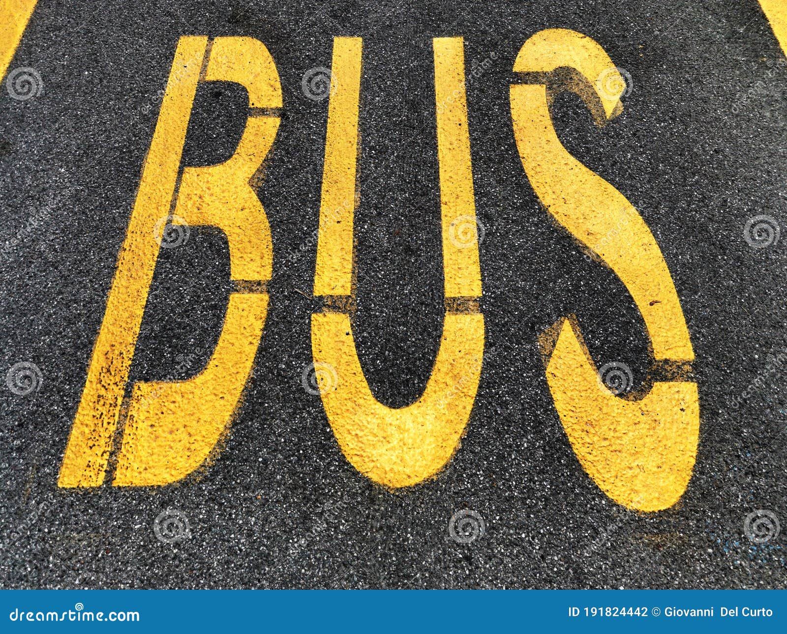 Bus Writing on Black Asphalt Stock Photo - Image of asphalt, road ...