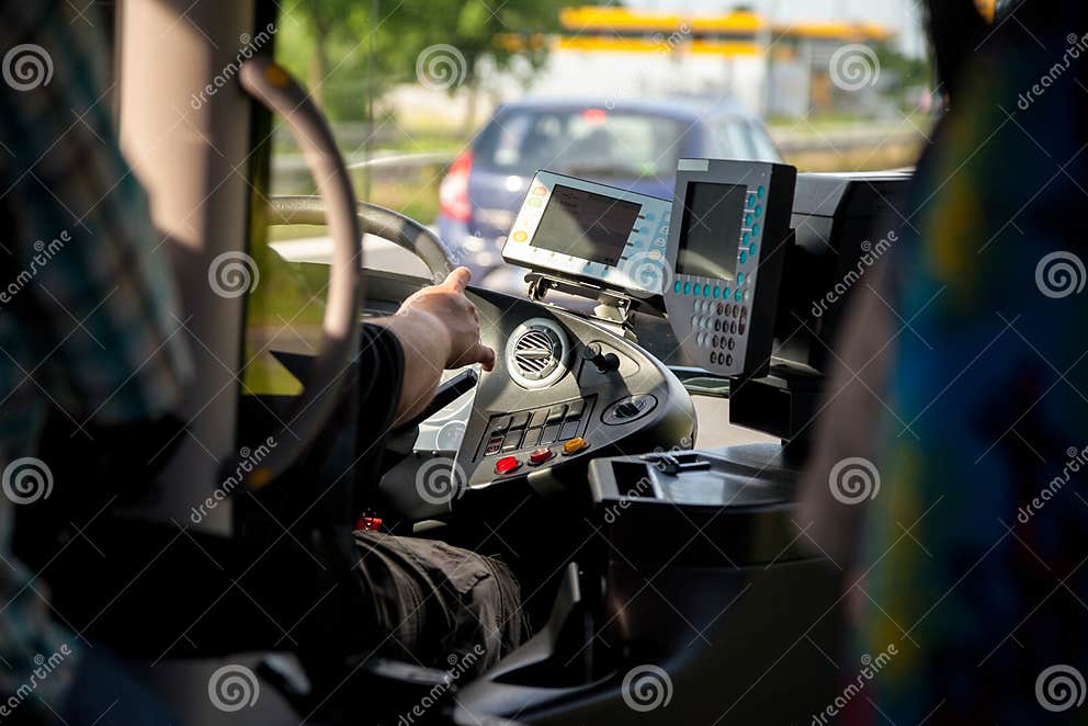 Busdriver in a cockpit stock photo. Image of young, glass - 73108724