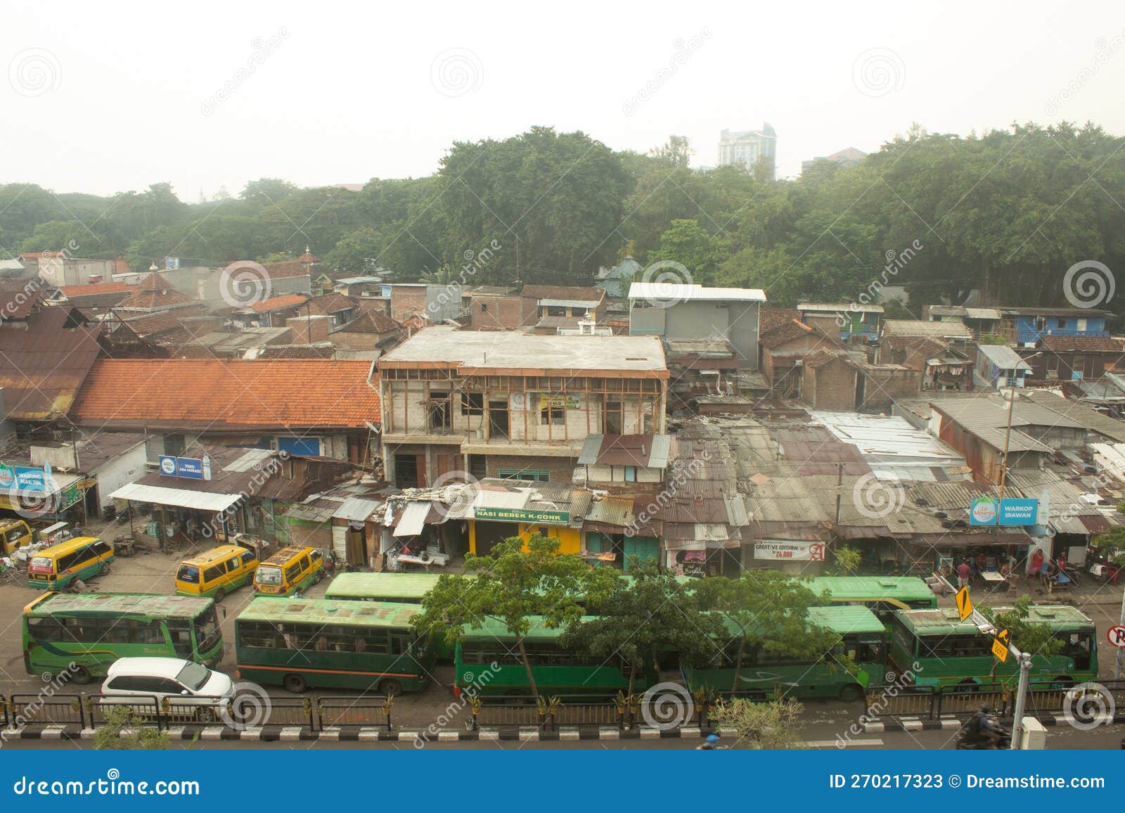 Buses and Minibuses Park at the Old Joyoboyo Terminal Editorial Stock ...