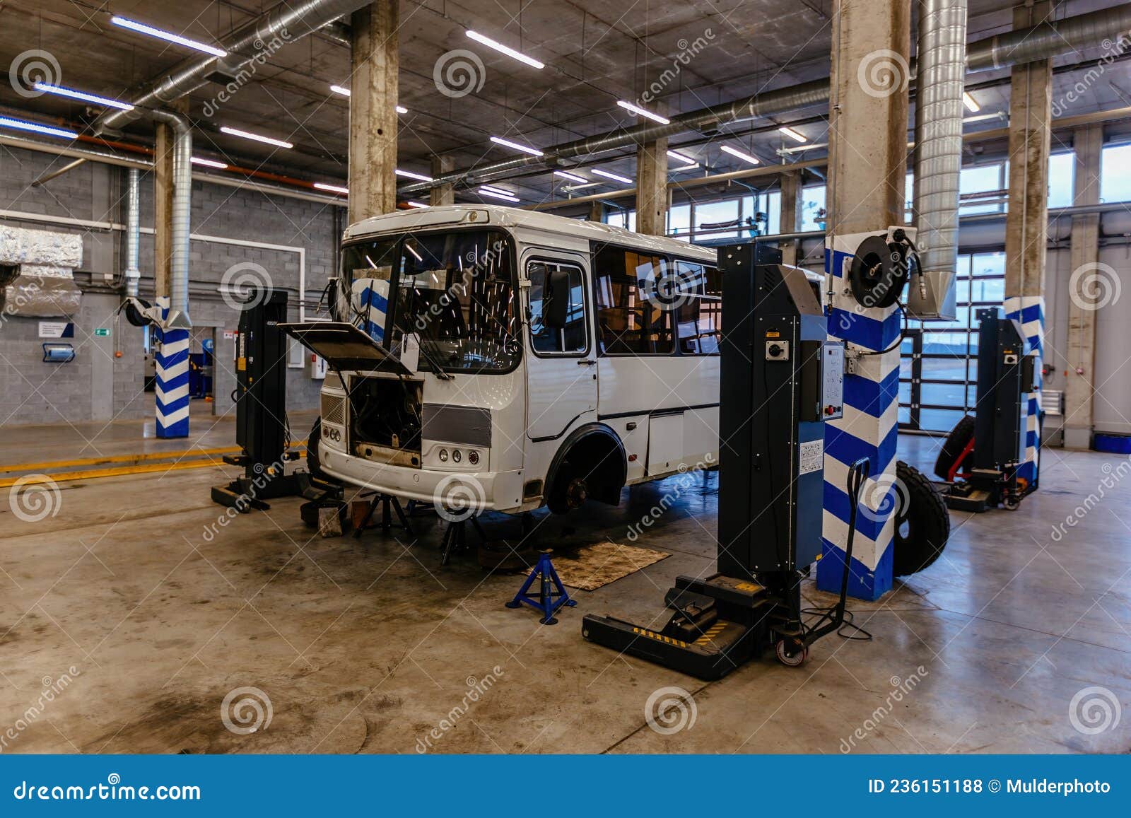 Buses in the Modern Repair Service Workshop Stock Photo - Image of ...