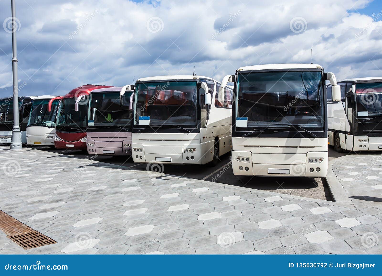 Buses on Parking on the Background of Cloudy Sky Stock Photo - Image of ...