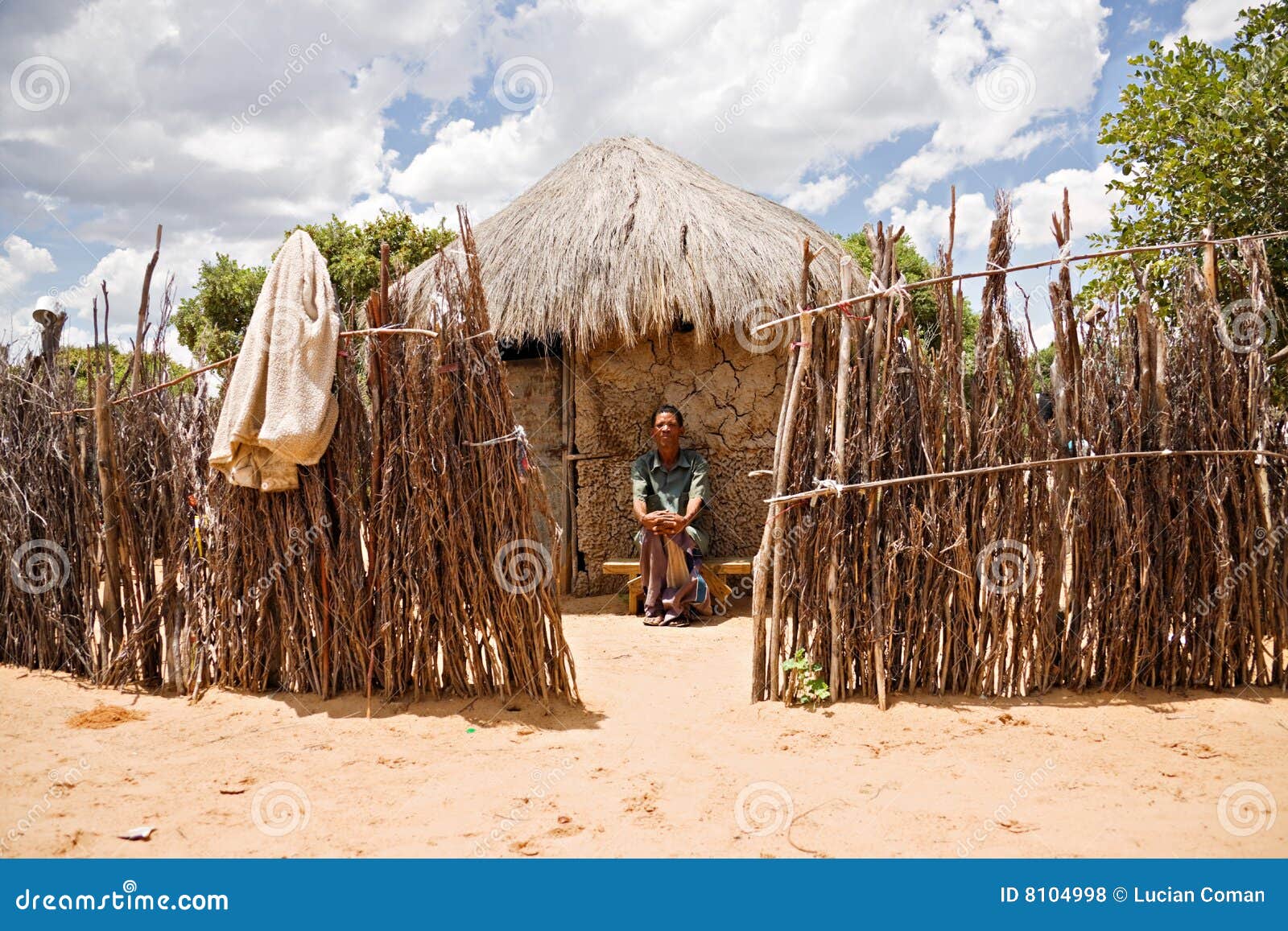 Bushman and his hut stock photo. Image of kalahari, african - 8104998