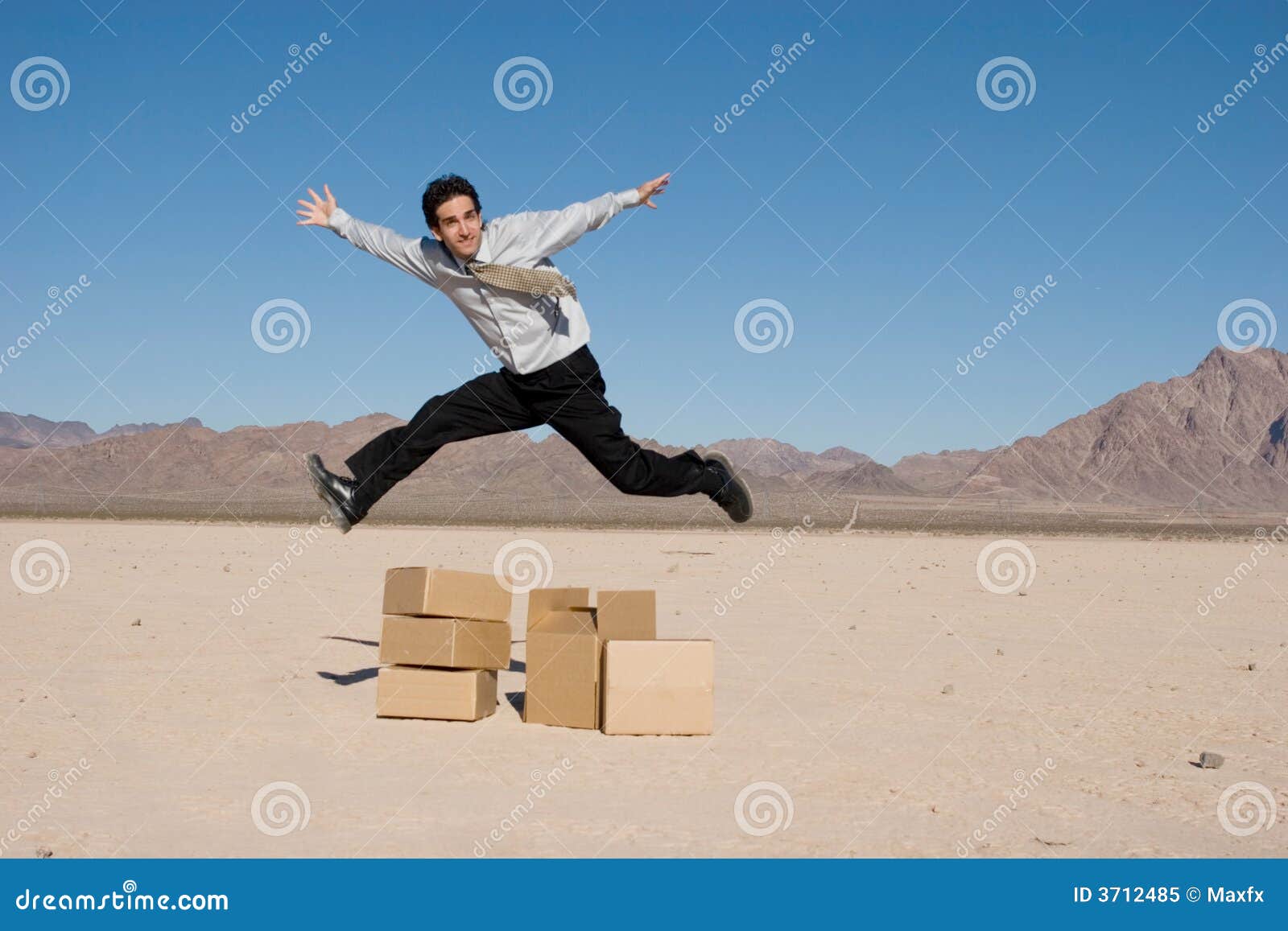 Businesman Jumping Over Boxes Stock Image - Image of ambitious ...