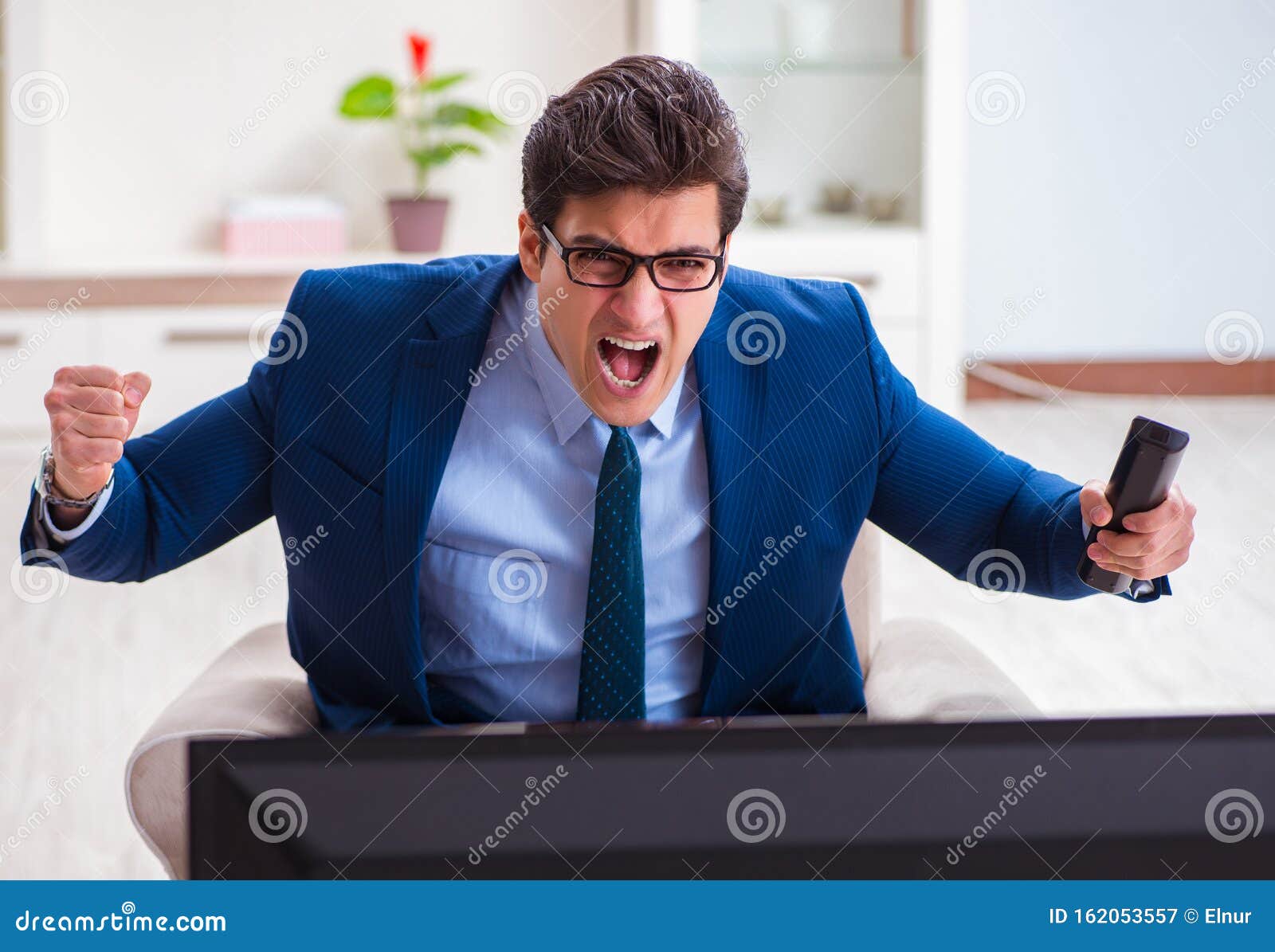 Businesman Watching Tv in Office Stock Image - Image of businessman ...