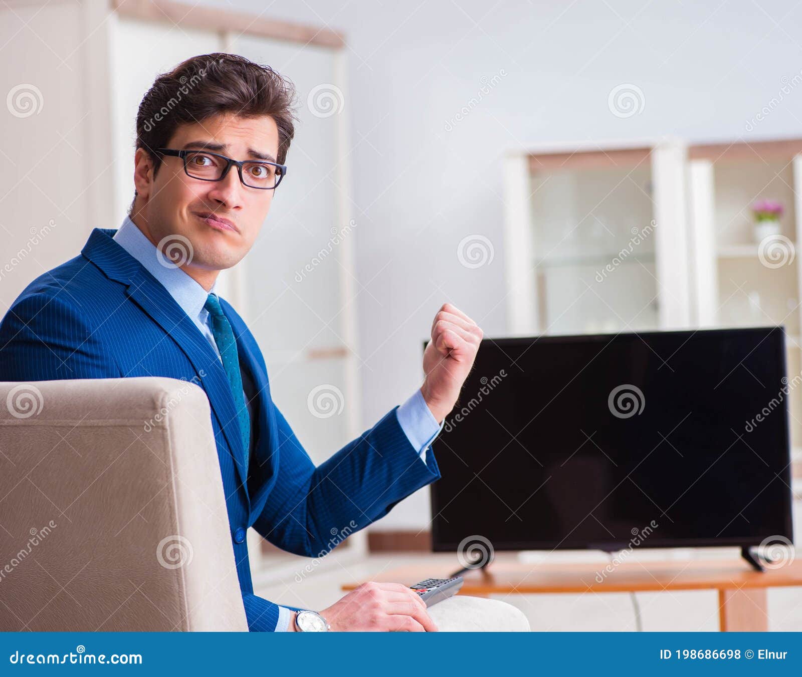 Businesman Watching Tv in Office Stock Photo - Image of lazy, enjoyment ...