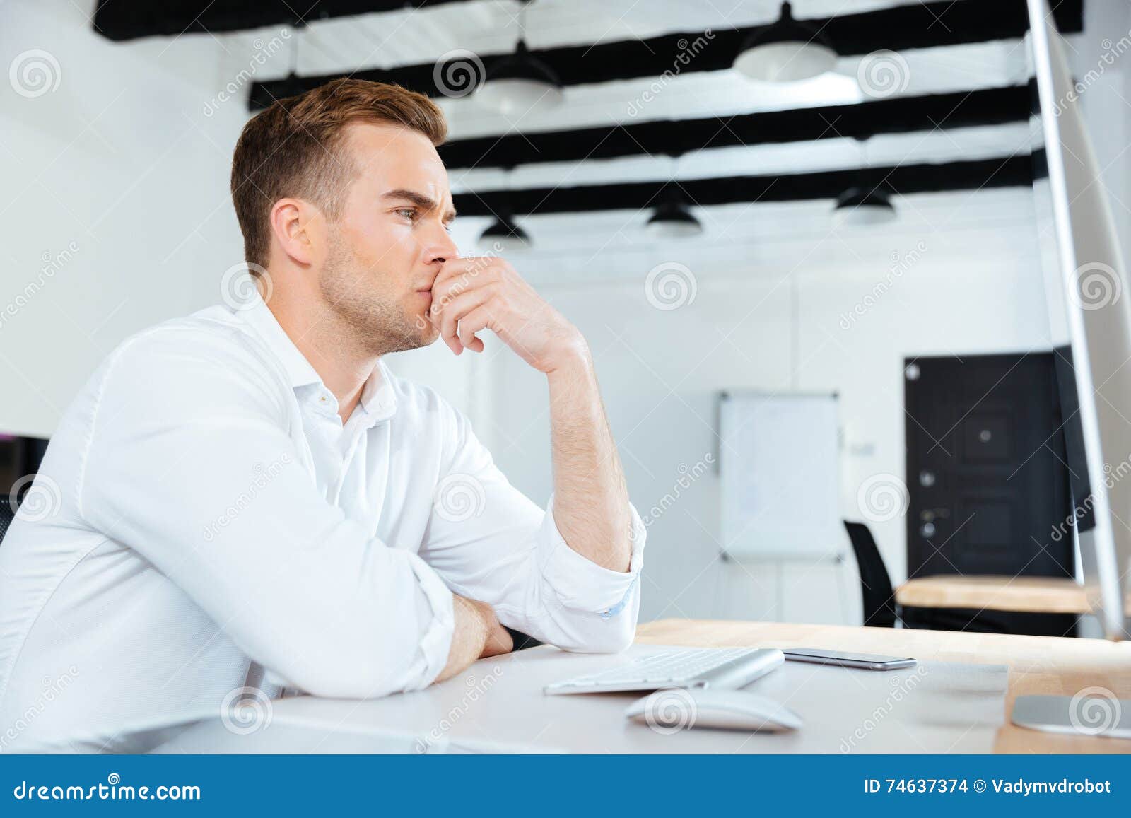 Businesman Working with Computer and Thinking at Workplace Stock Photo ...
