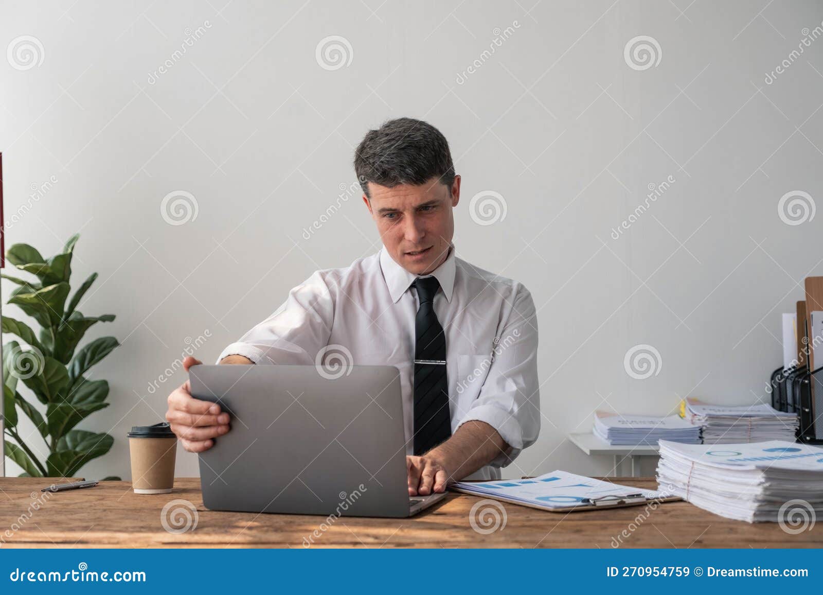 Business Accountant Bookkeeper in Office Looking at Documents and ...