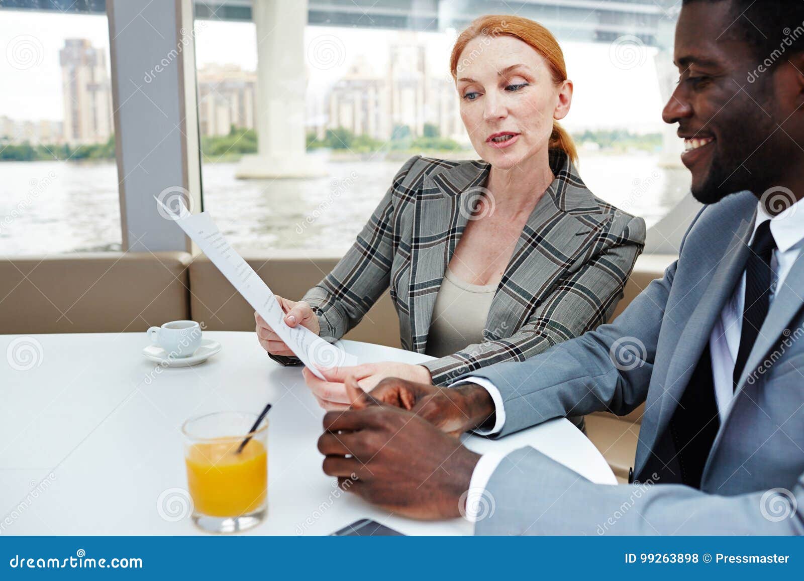 Explaining contract terms stock photo. Image of conversation - 99263898