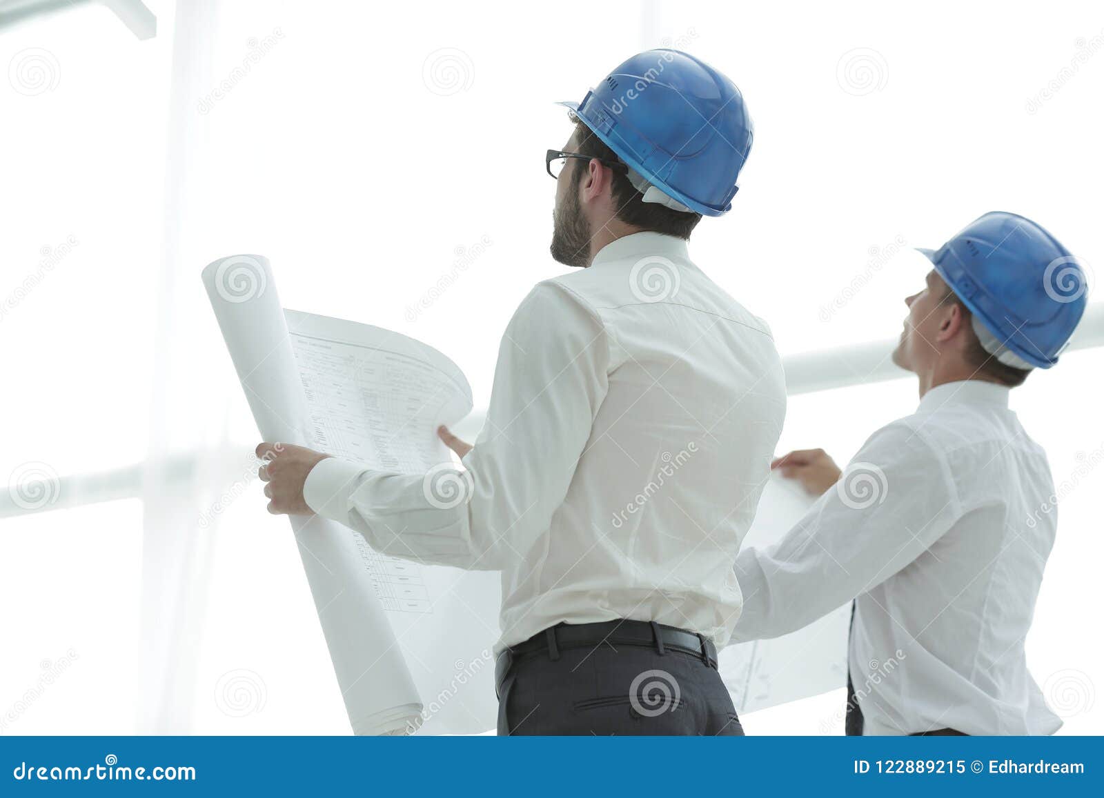 Rear View.architect and Builder Looking at Blank Screen Stock Image ...