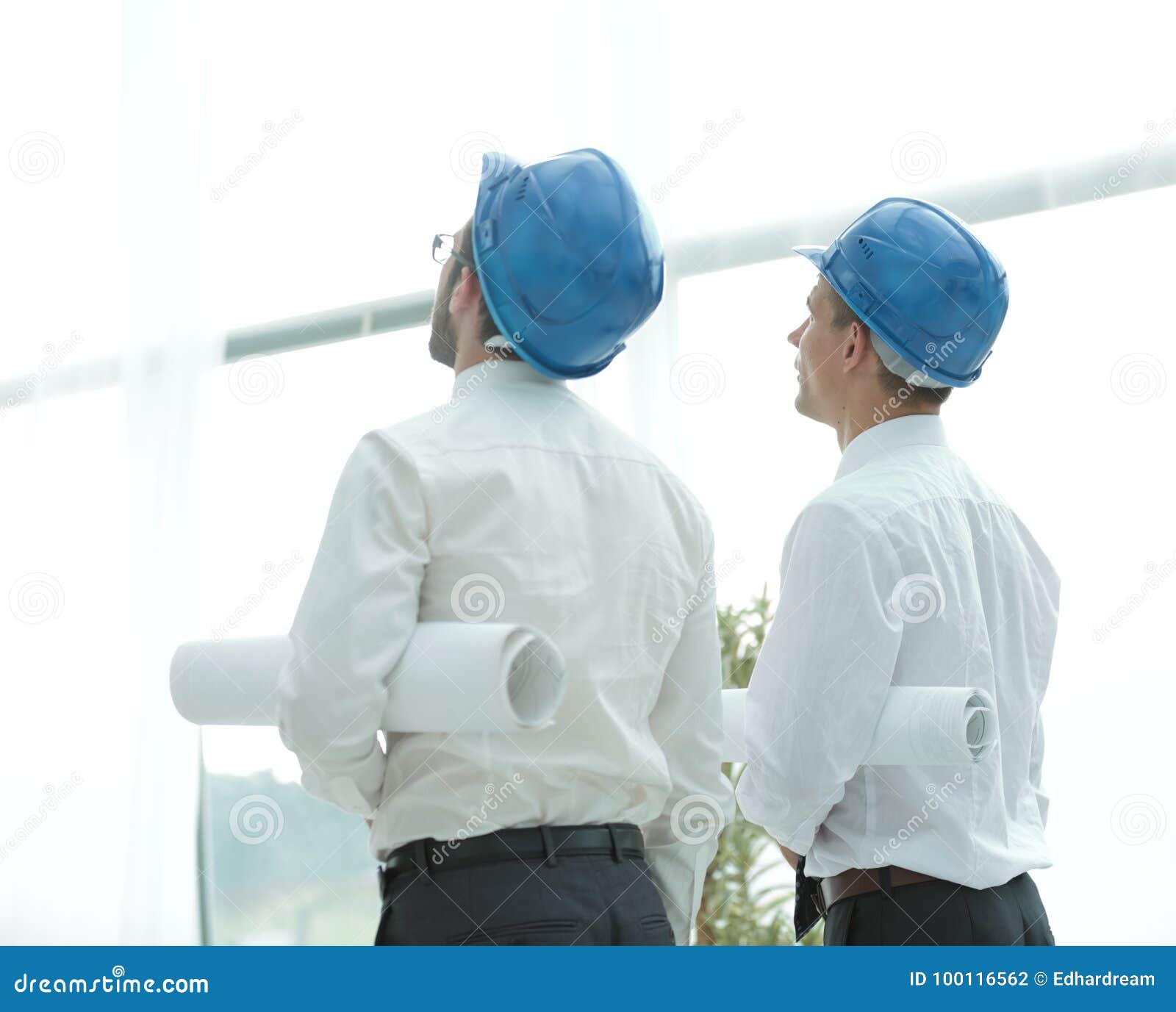 Rear View. Architect and Builder Stock Photo - Image of construction ... Rear View. Architect and Builder Stock Photo - Image of construction ...