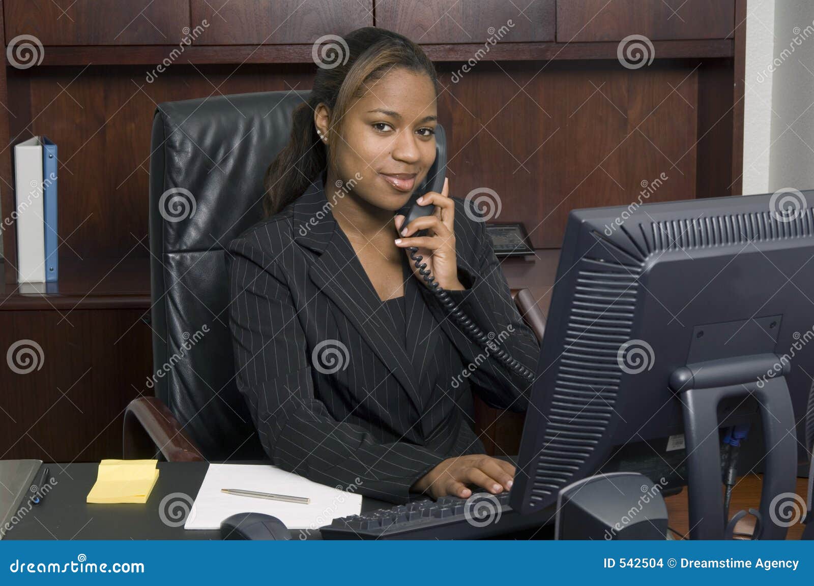 Business call with a smile stock photo. Image of woman - 542504