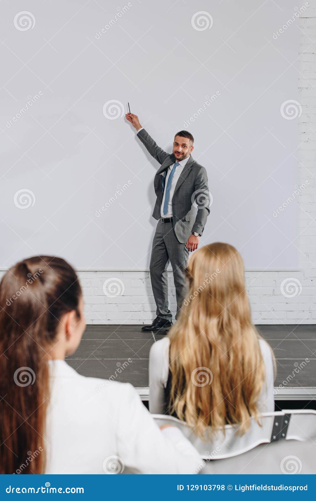 Business Coach Pointing on Board during Training Stock Photo - Image of ...