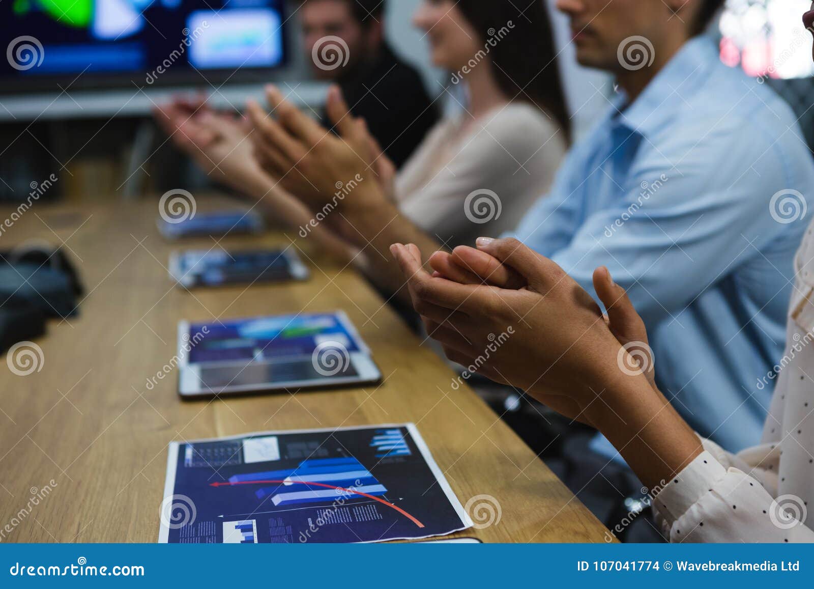 Business Colleagues Clapping Hands in Meeting Stock Photo - Image of ...