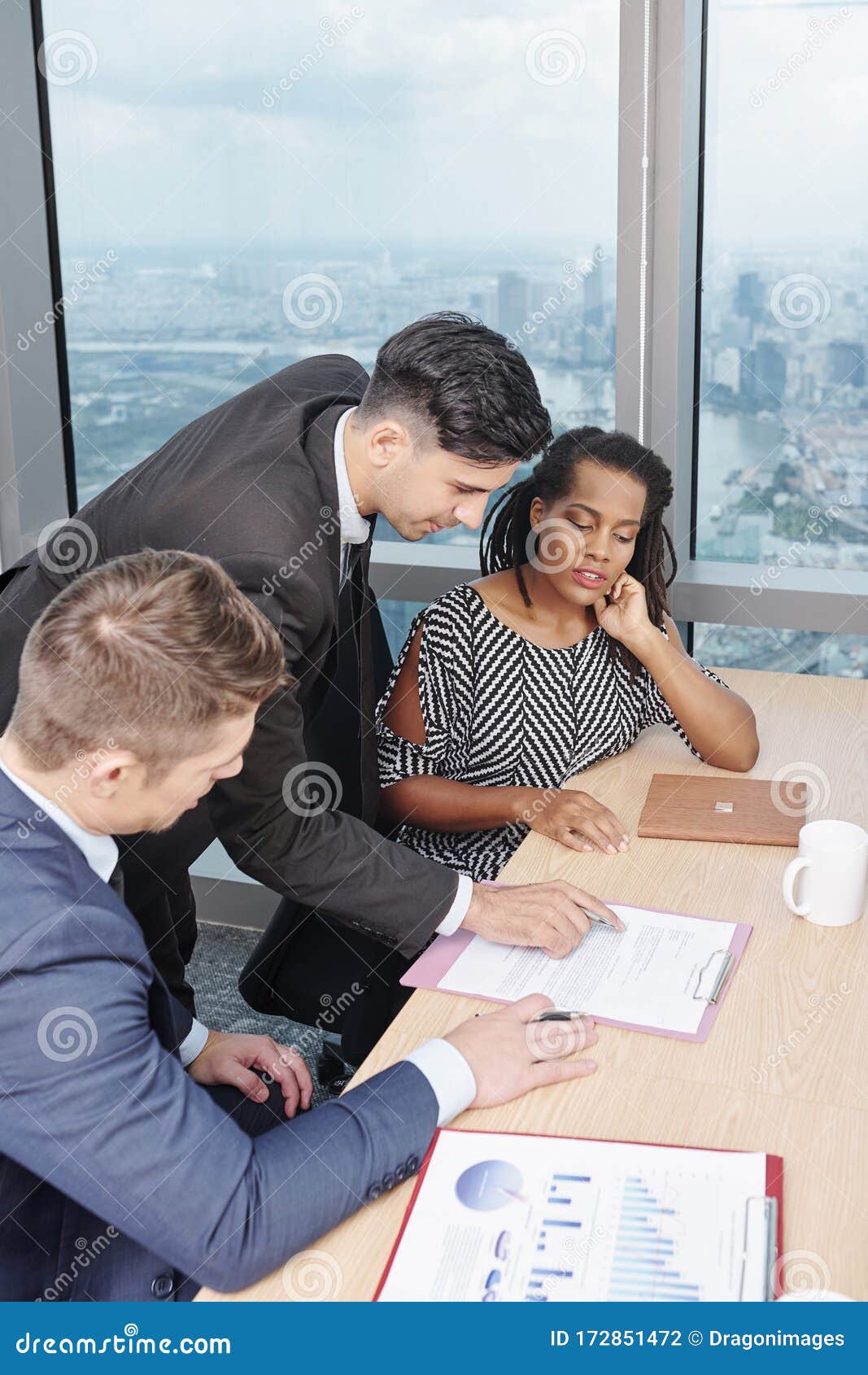 Business Colleagues Discussing Contract Stock Photo - Image of adult ... Business Colleagues Discussing Contract Stock Photo - Image of adult ...