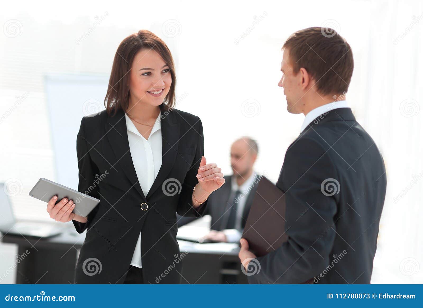 Business Colleagues Discussing Work Issues at the Office Stock Image ...