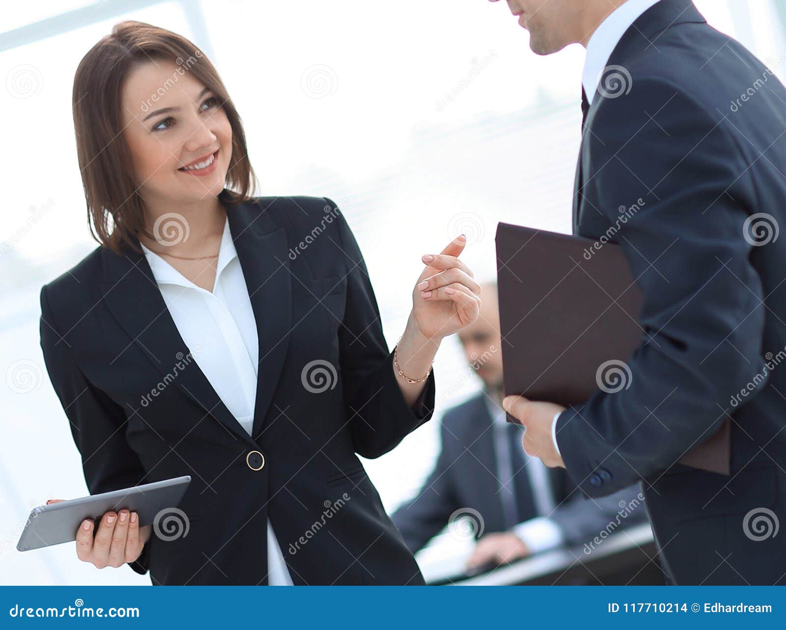 Business Colleagues Discussing Work Issues at the Office Stock Photo ...