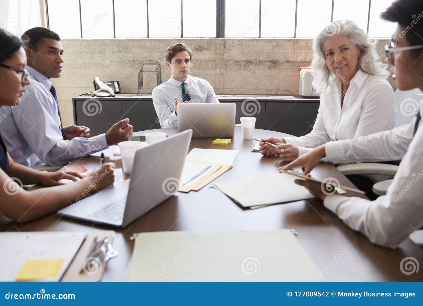 Business Colleagues in Discussion at a Meeting Stock Photo - Image of ...