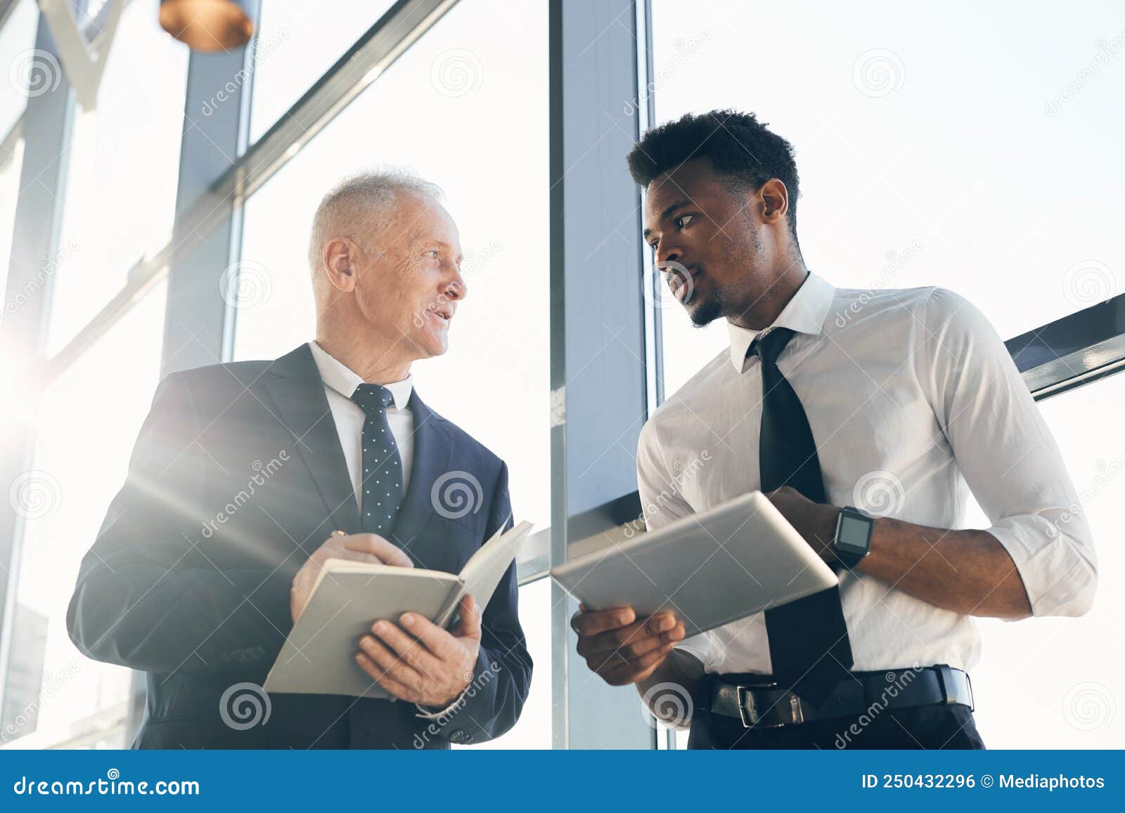 Business Colleagues Finding Solution Together Stock Photo - Image of ...